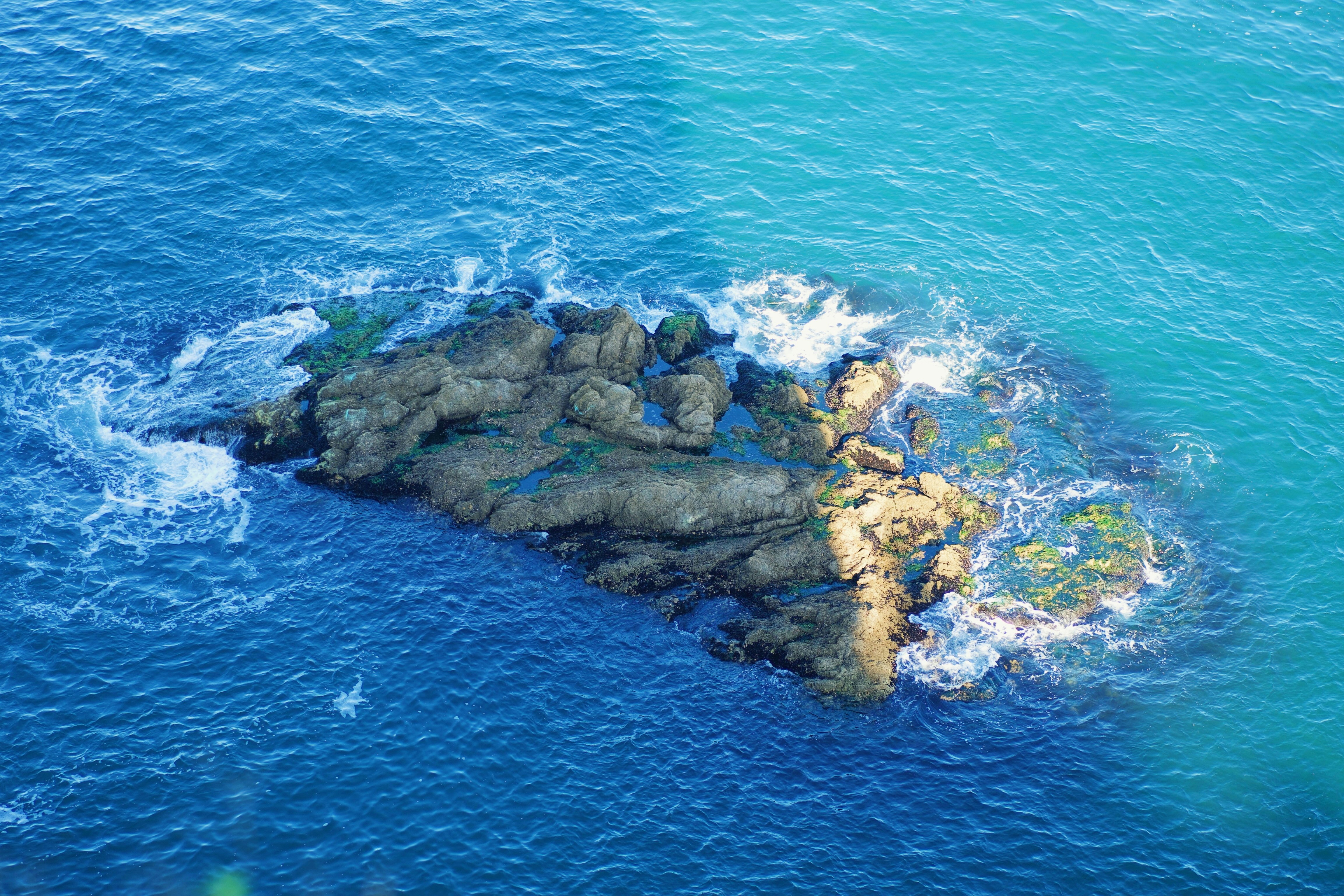 Isolated Rocky Oasis in Turquoise Waters