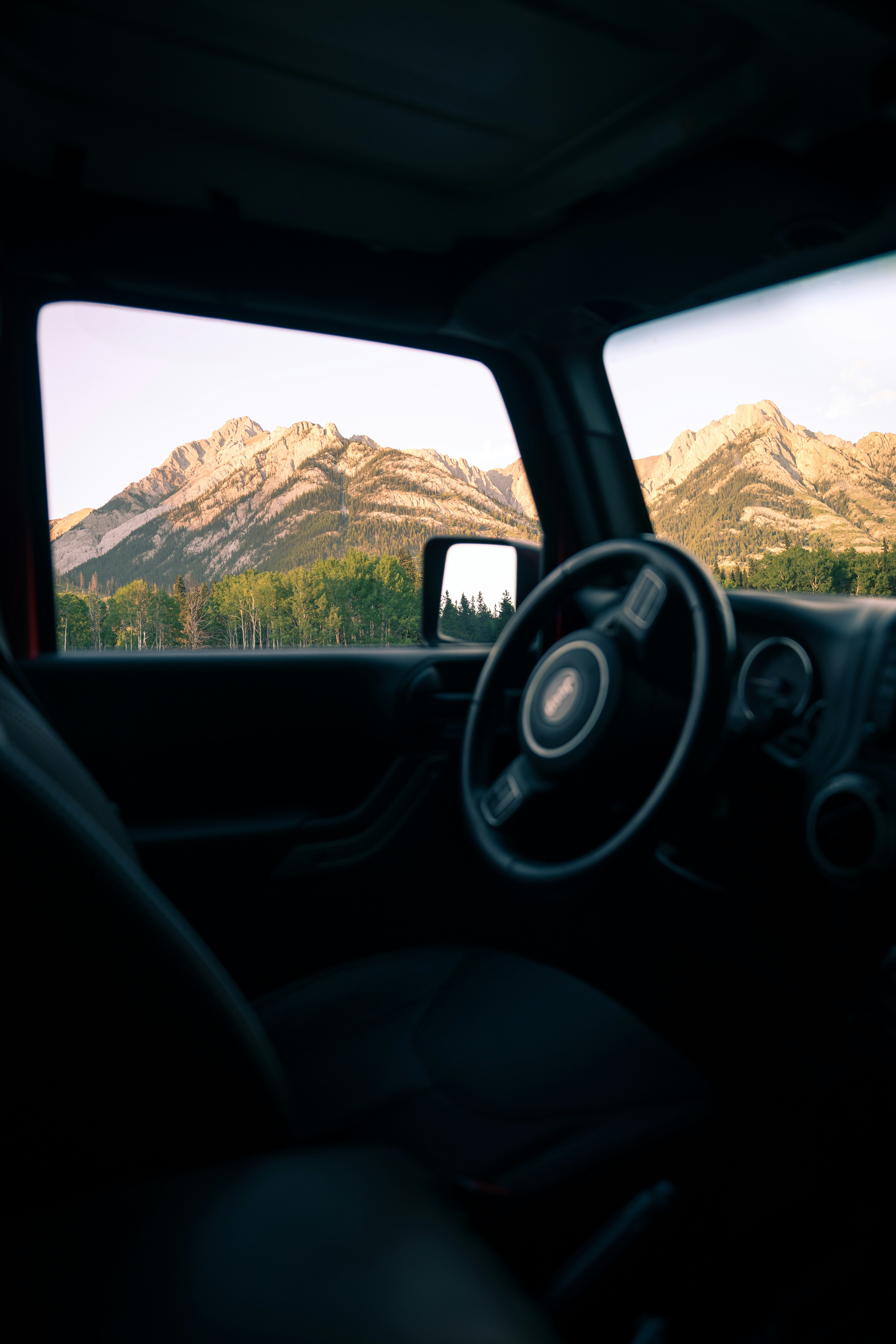 Jeep interior with mountain views in the background. photo – Free ...