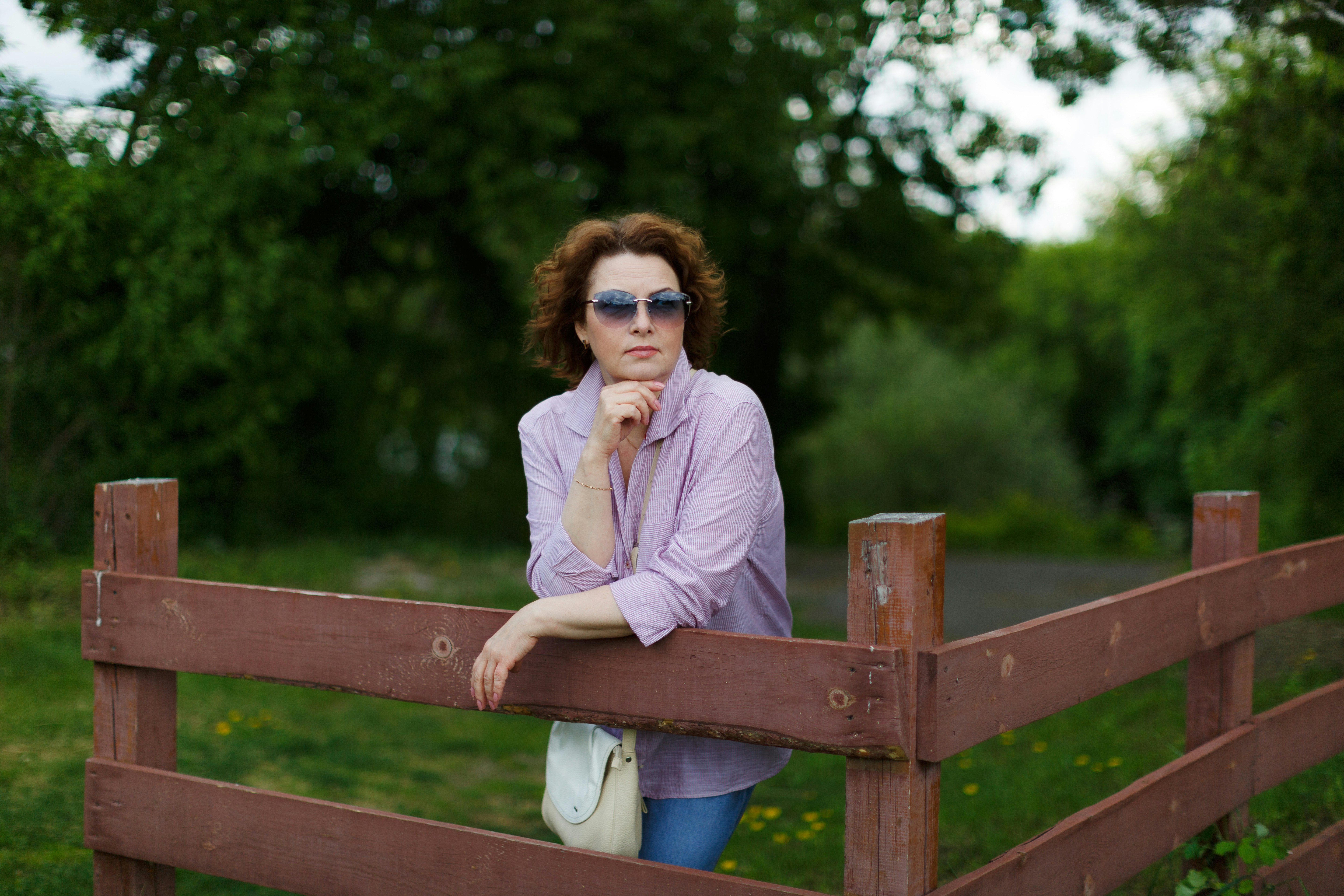 Quiet Confidence by the Fence: Portrait in Lavender Light