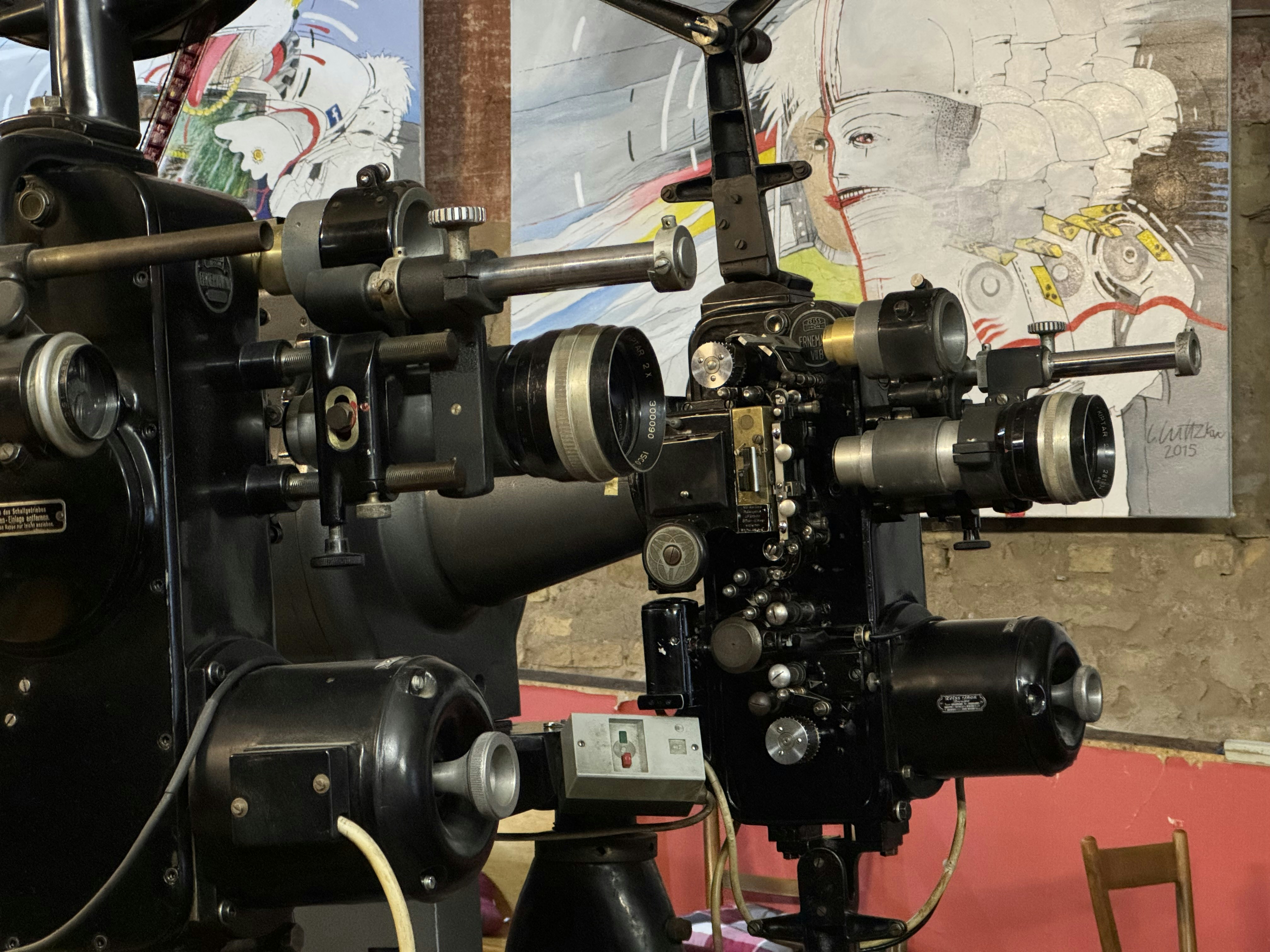 Old Film Procectors | Vintage film projectors are on display.