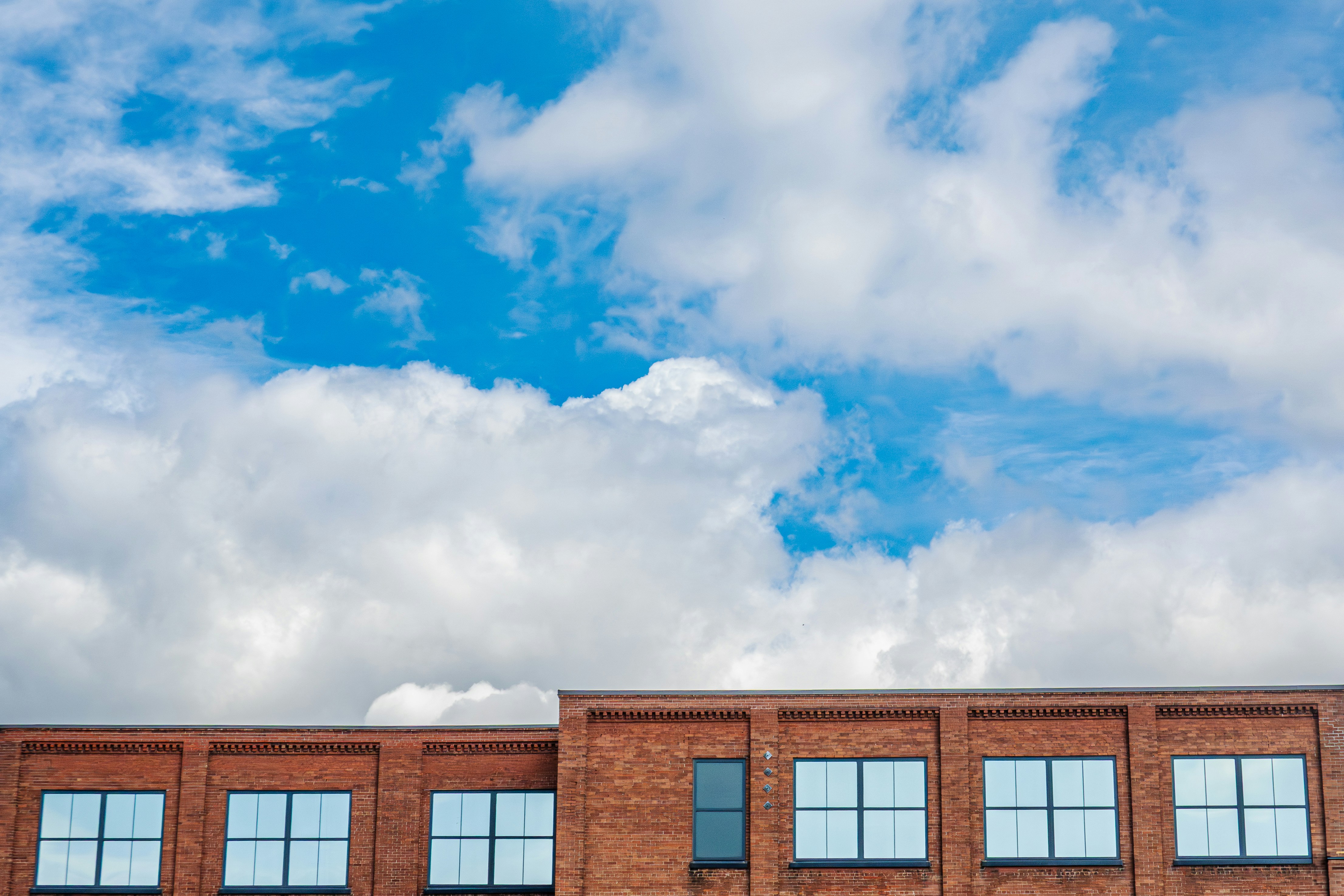 brilliant skies and an old building