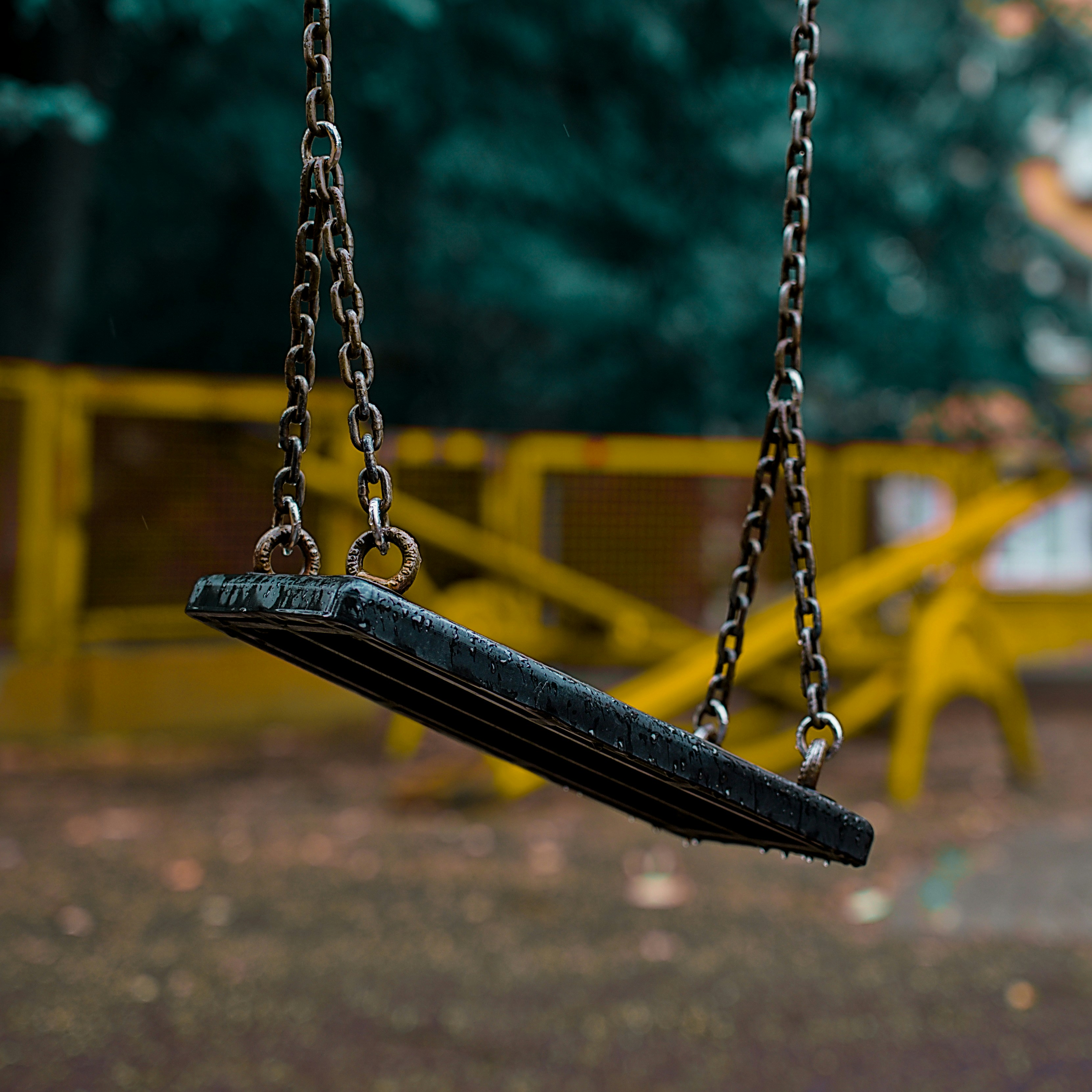 Empty swing set in a park.