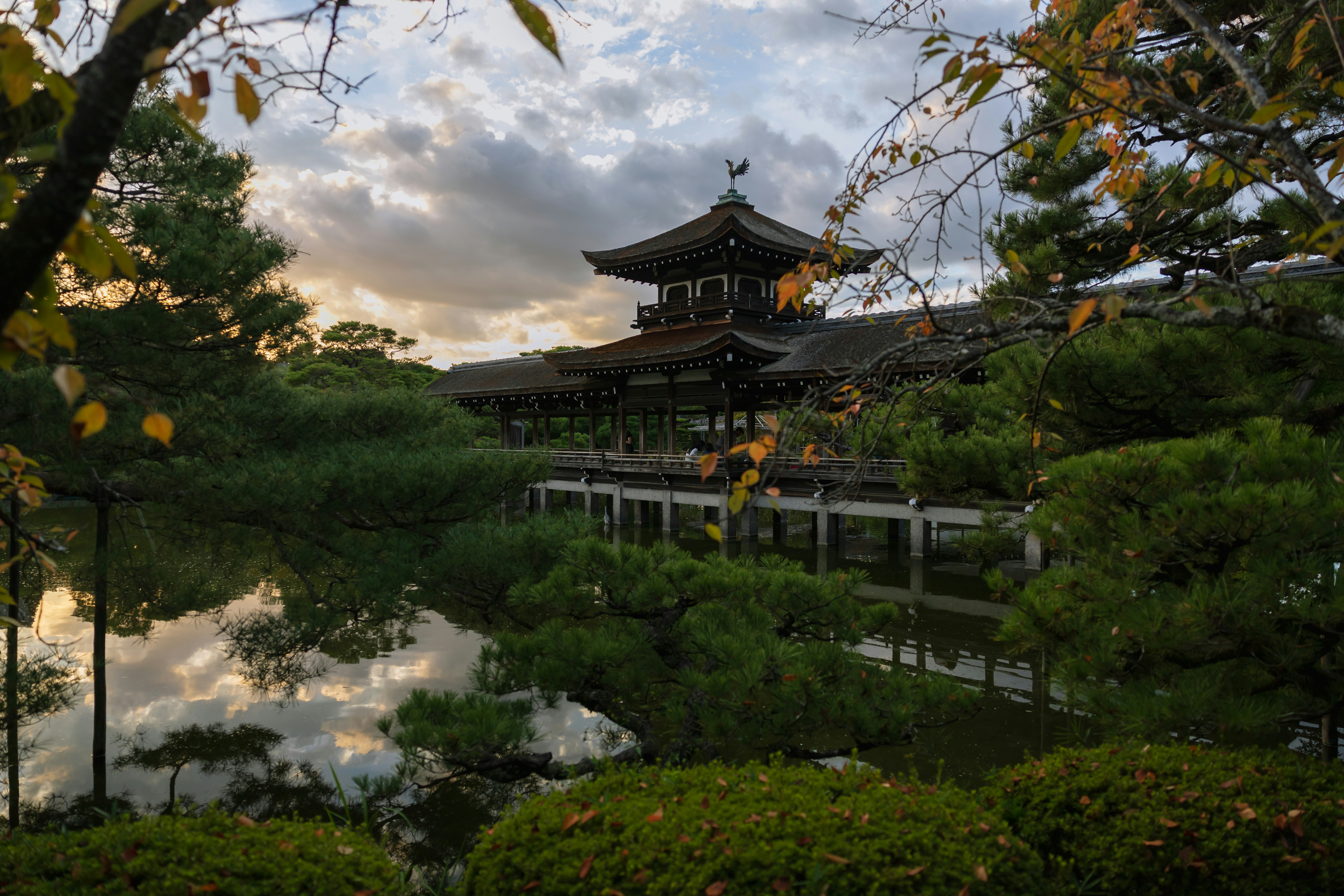 A temple by a peaceful pond.