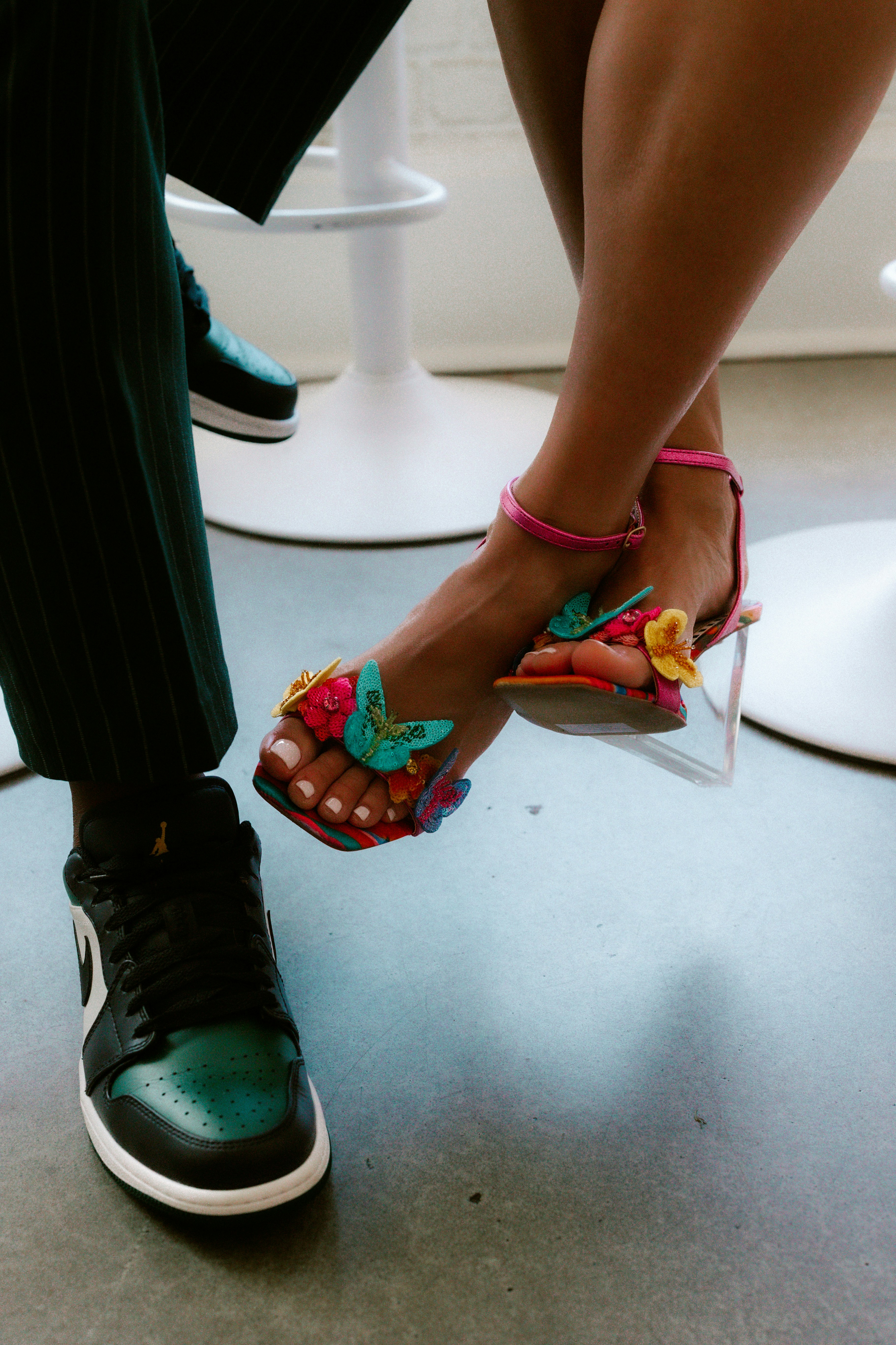 Butterfly-Embellished Heels: A Colorful Clash of Couture and Casual Footwear