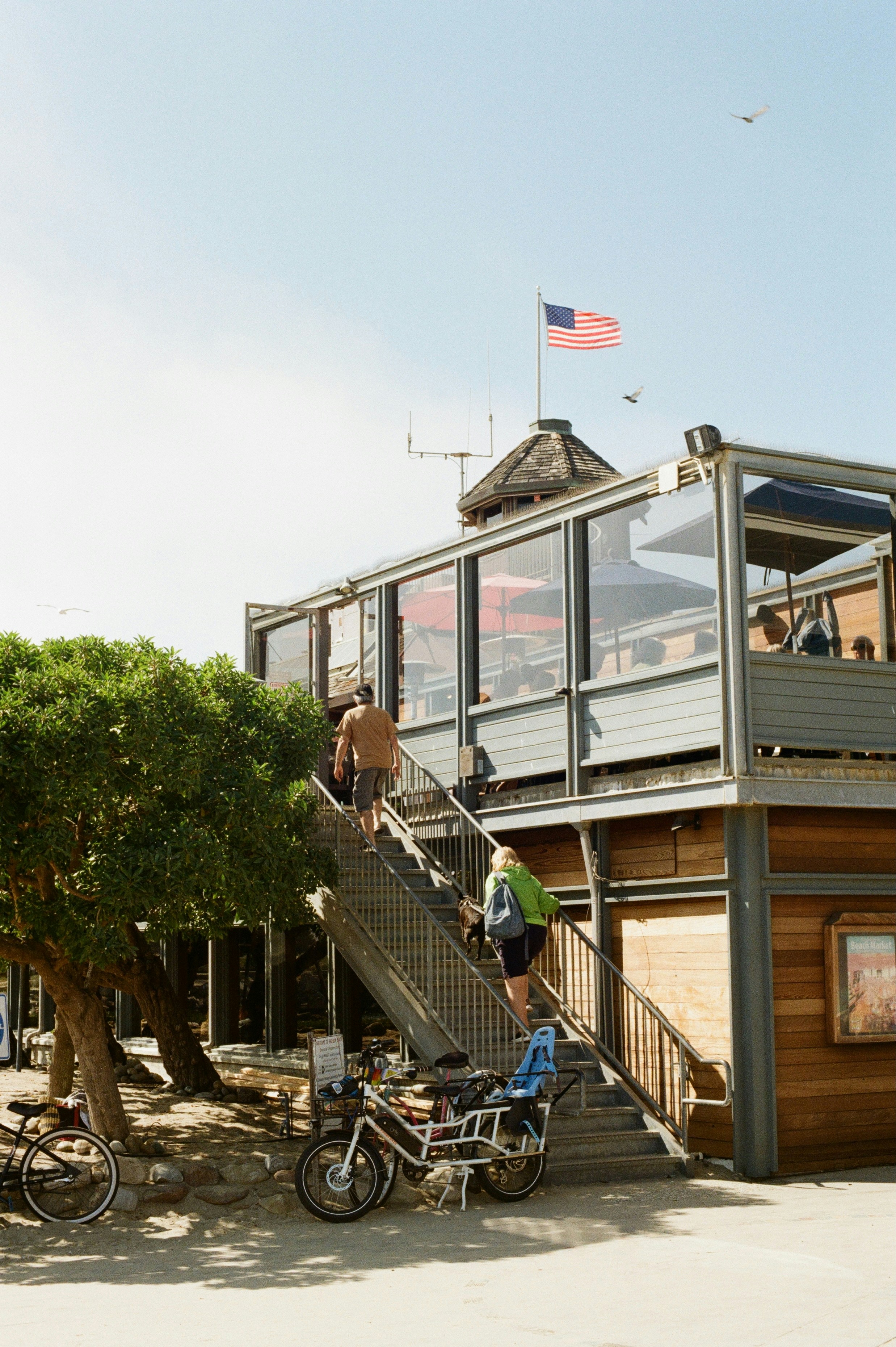 Sunlit Staircase to the Glass-Deck Beach Café