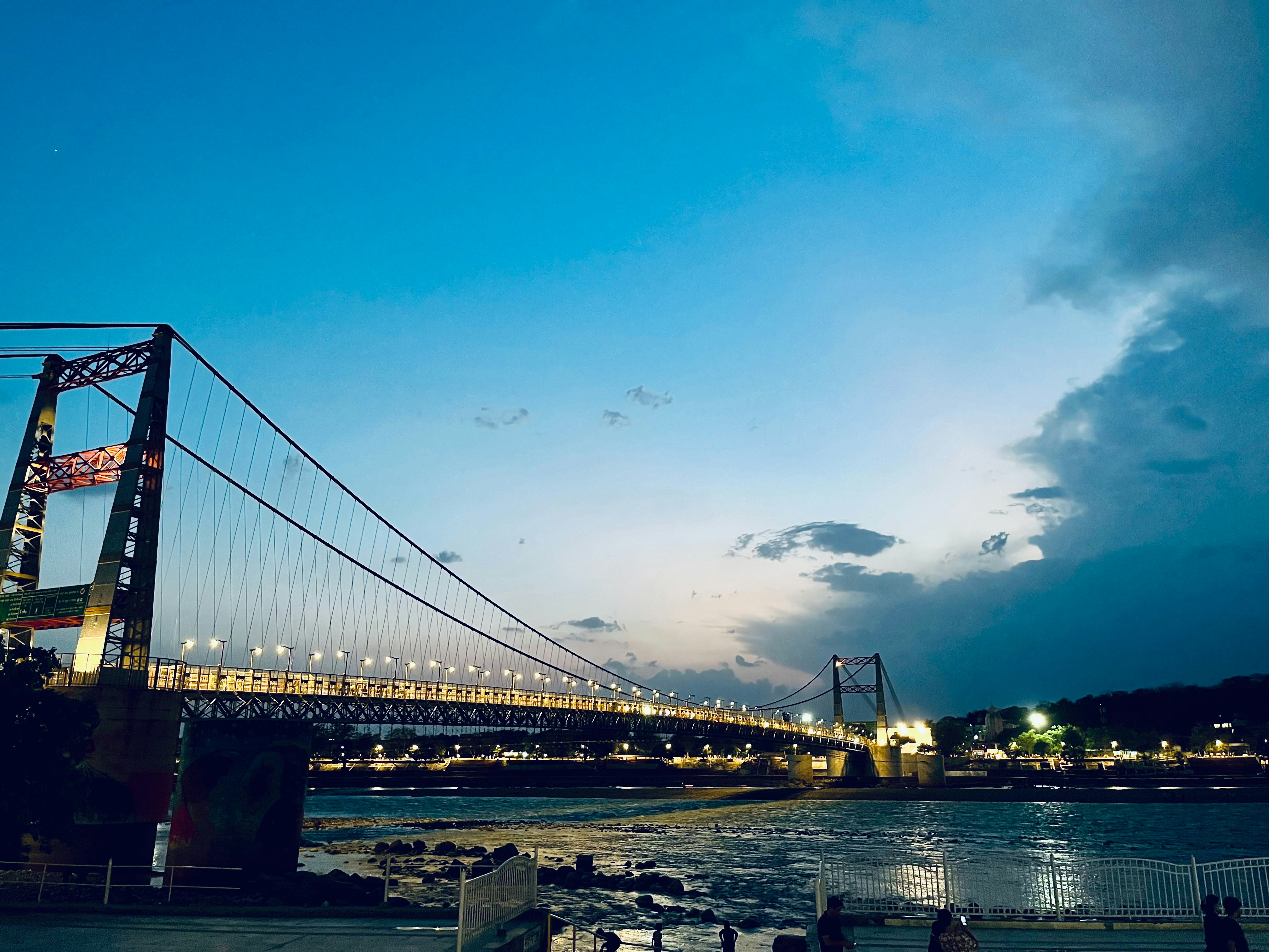 Twilight Reflections: The Bridge Beneath the Dusk