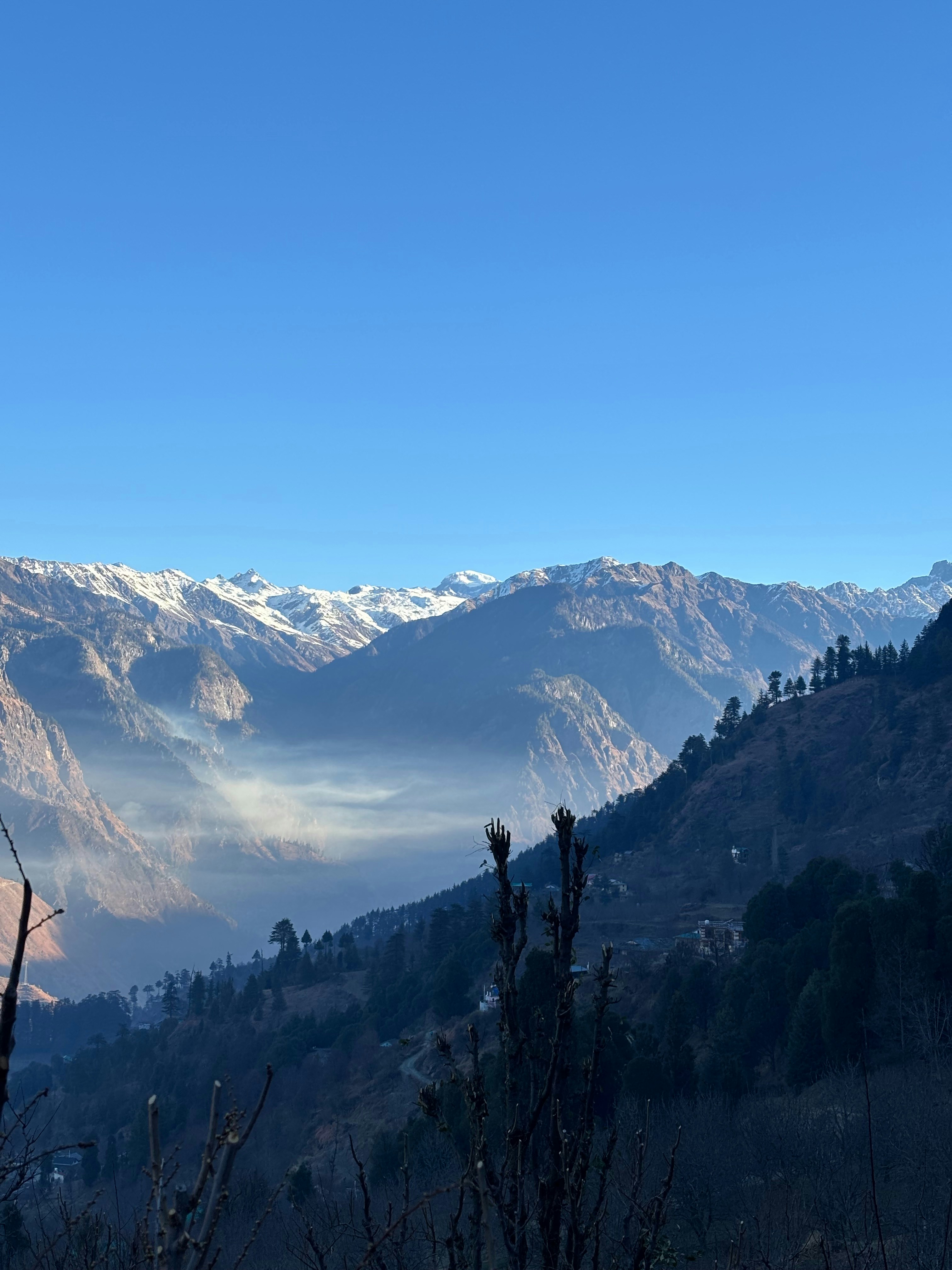 Mountains with snow and a clear blue sky.