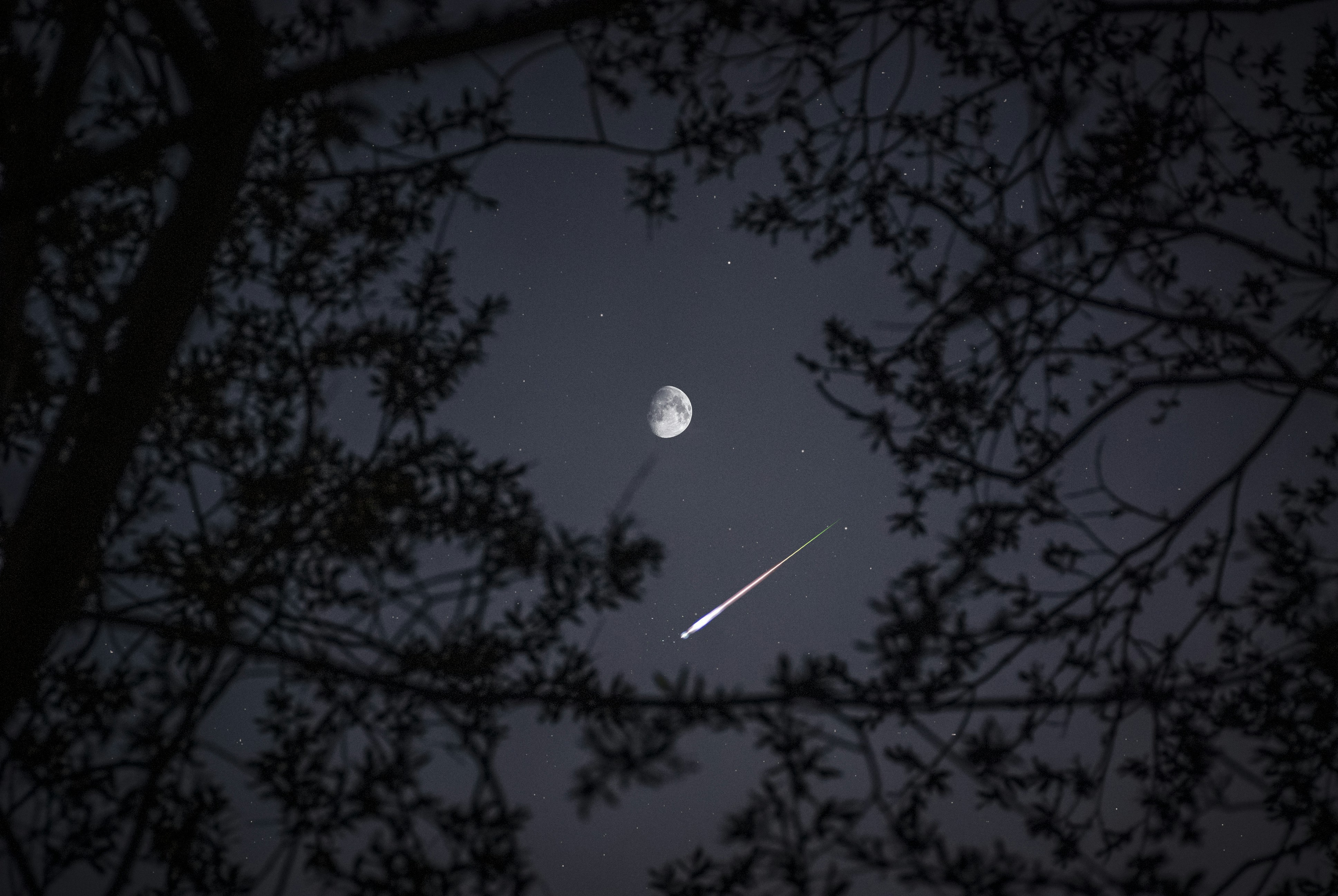 When I was returning home from work, I saw such a moon and decided to take a picture, I added a comet for beauty) (Kamchatka) | A meteor streak under the moon and stars.