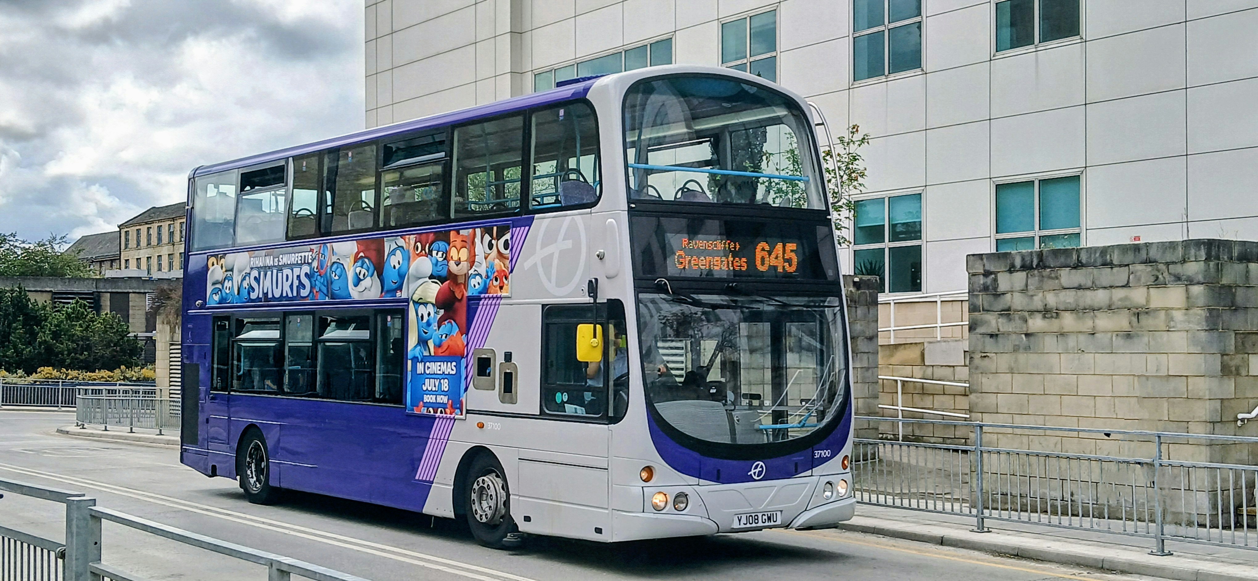 A Bradford (West Yorkshire) bus operating Route 645 to Greengates in Bradford, West Yorkshire, England, United Kingdom. Taken on Wednesday 9th July 2025. | A double-decker bus is driving down the street.