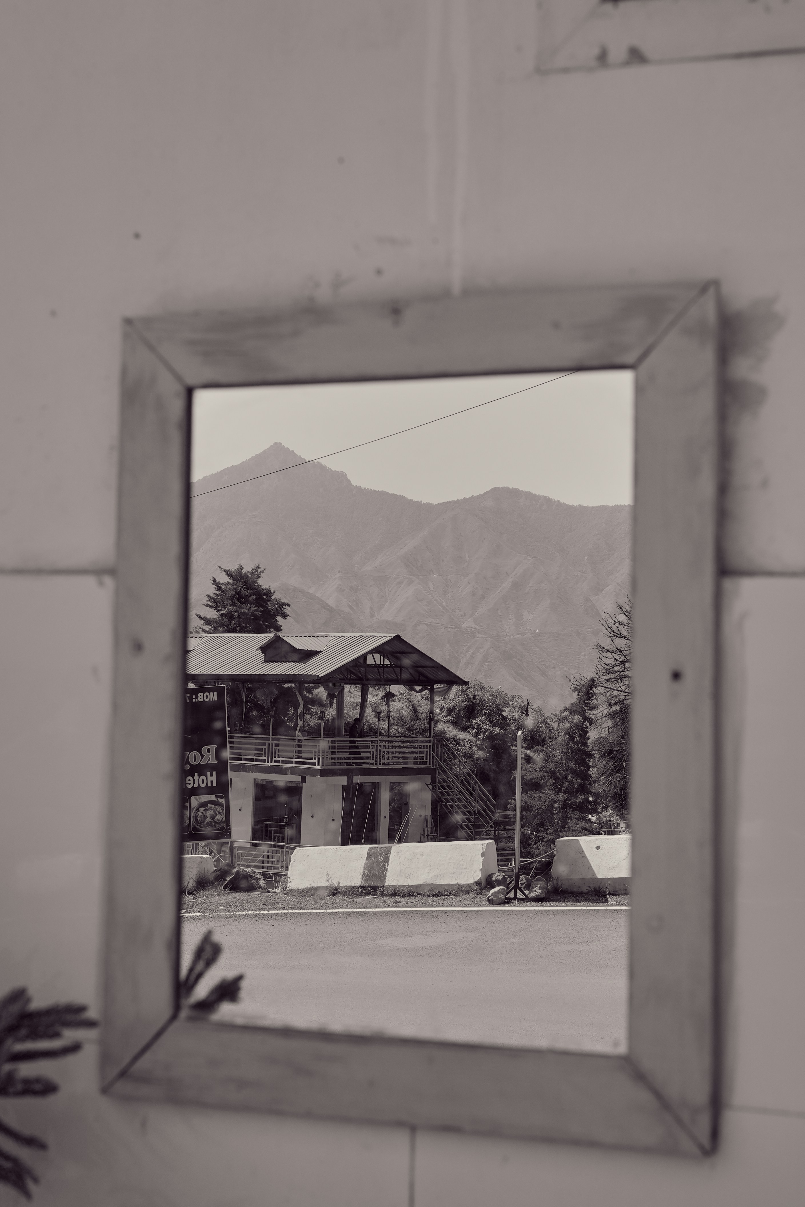 Reflections of Serenity: A Window to the Mountains