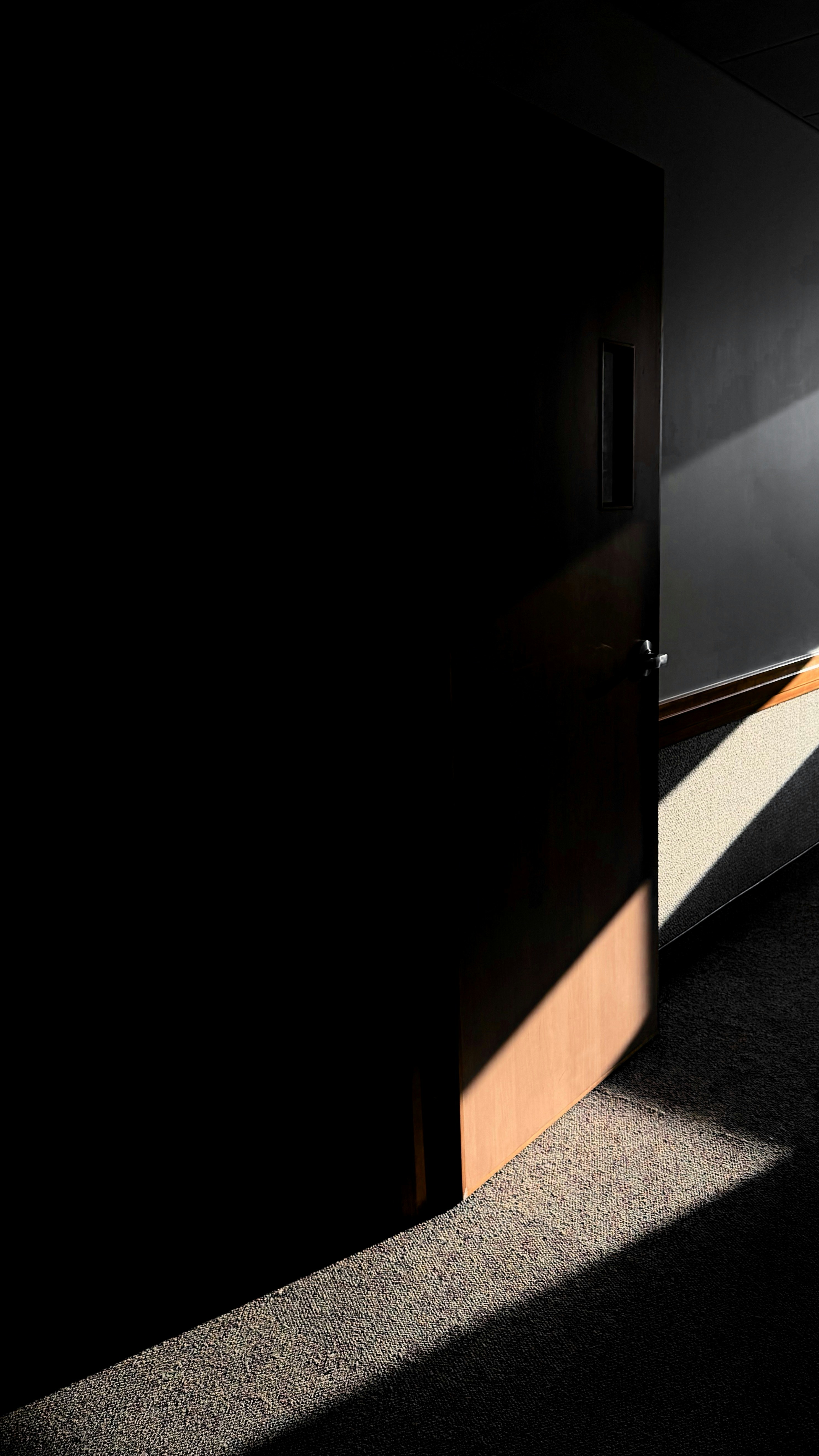 Shadows and light surround a partially open door. photo – Free Interior ...