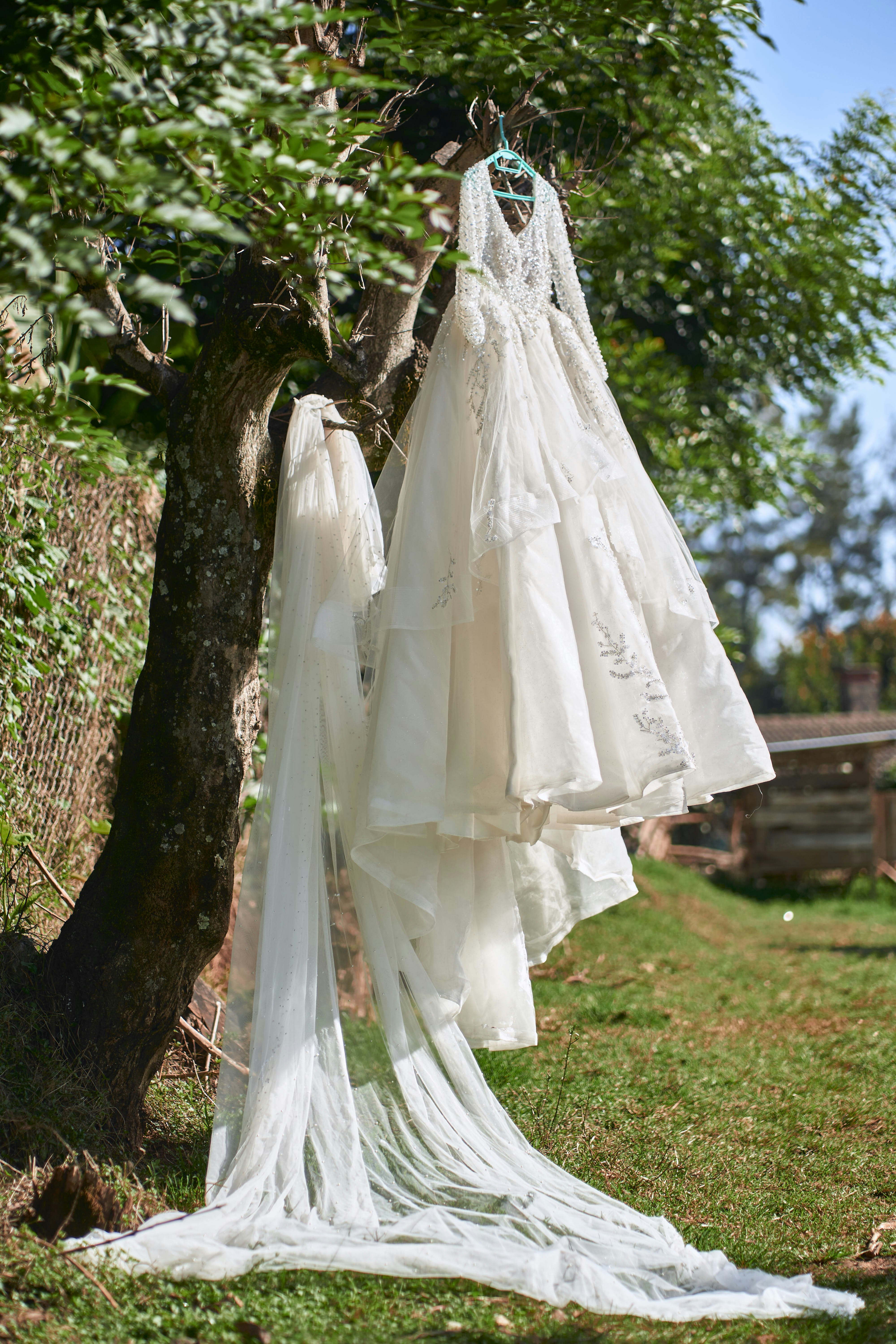Whispers of Elegance: A Bridal Moment in Nature