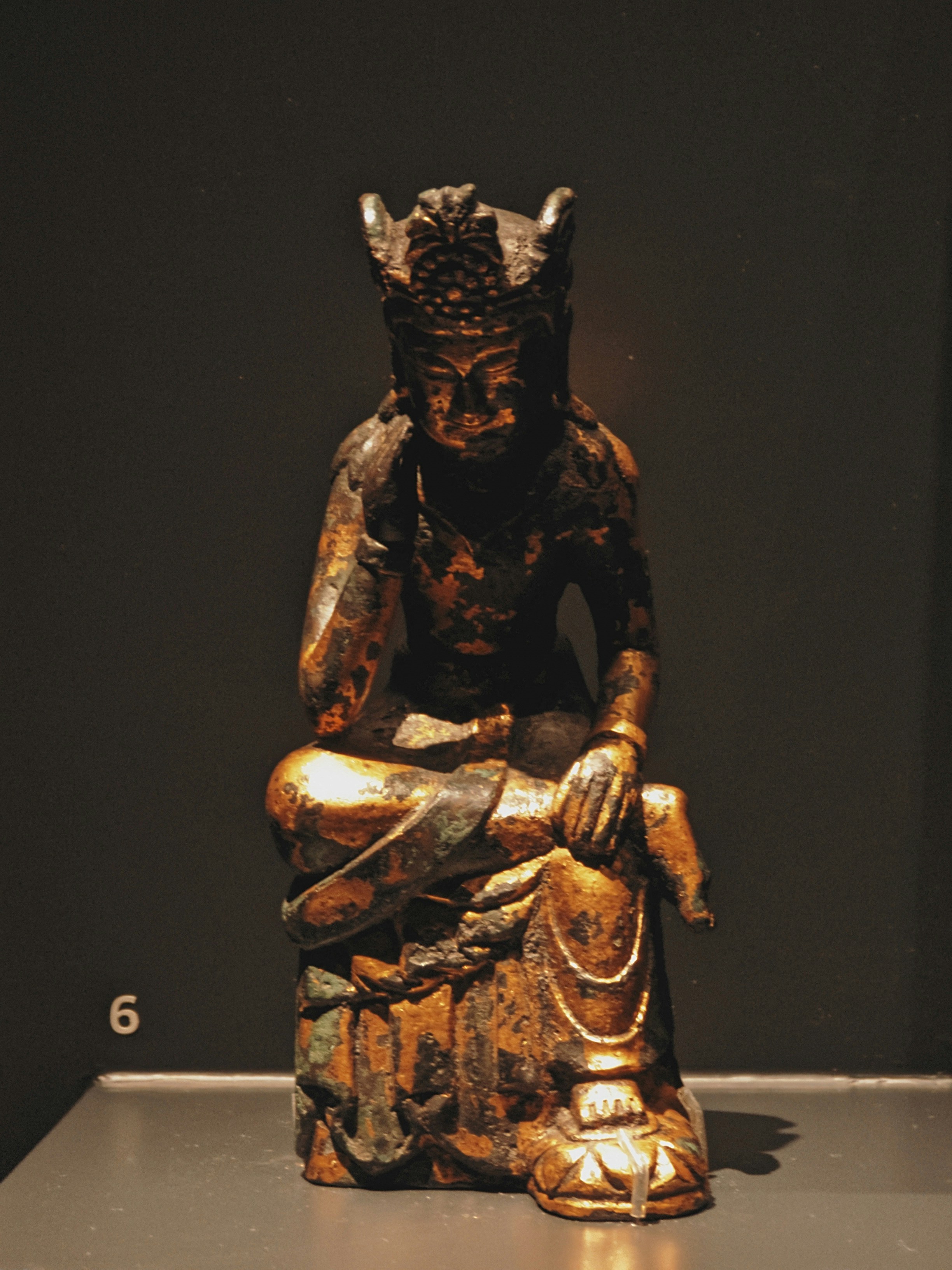 An ancient bronze buddha statue.