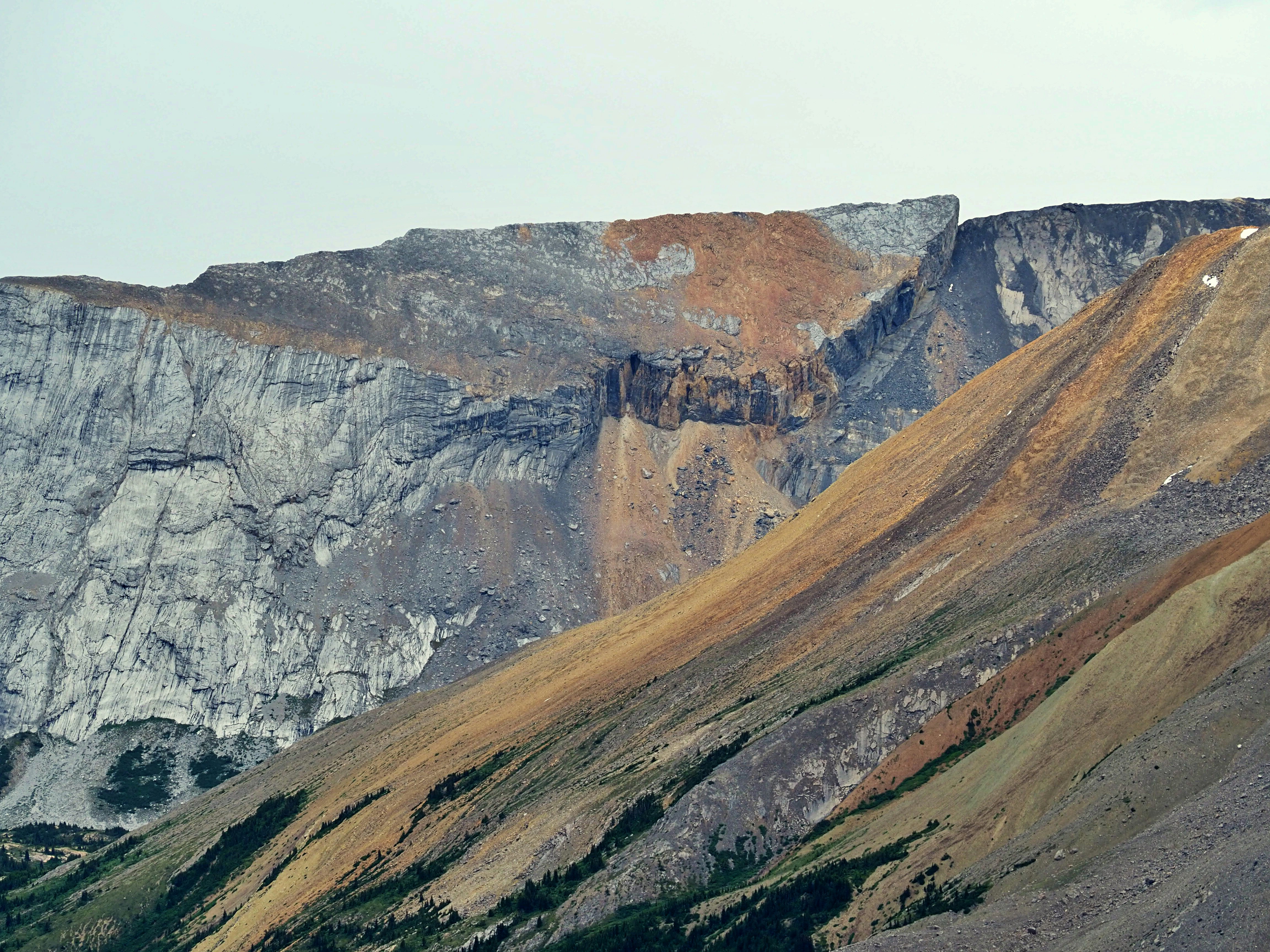 Colorful mountain sides and rugged peaks are visible.