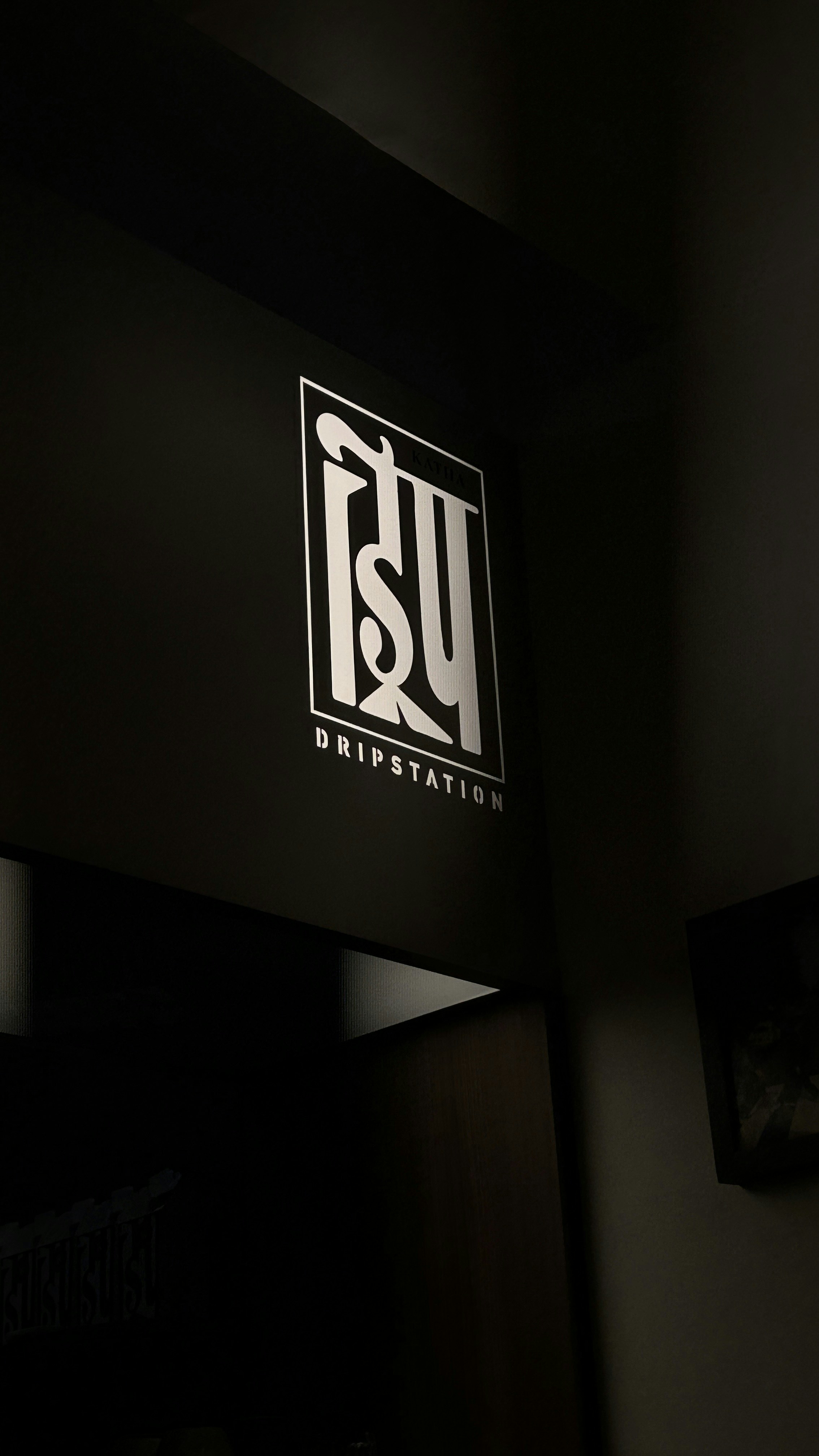 The image shows a "drip station" logo on a wall. photo – Free Wallpaper ...