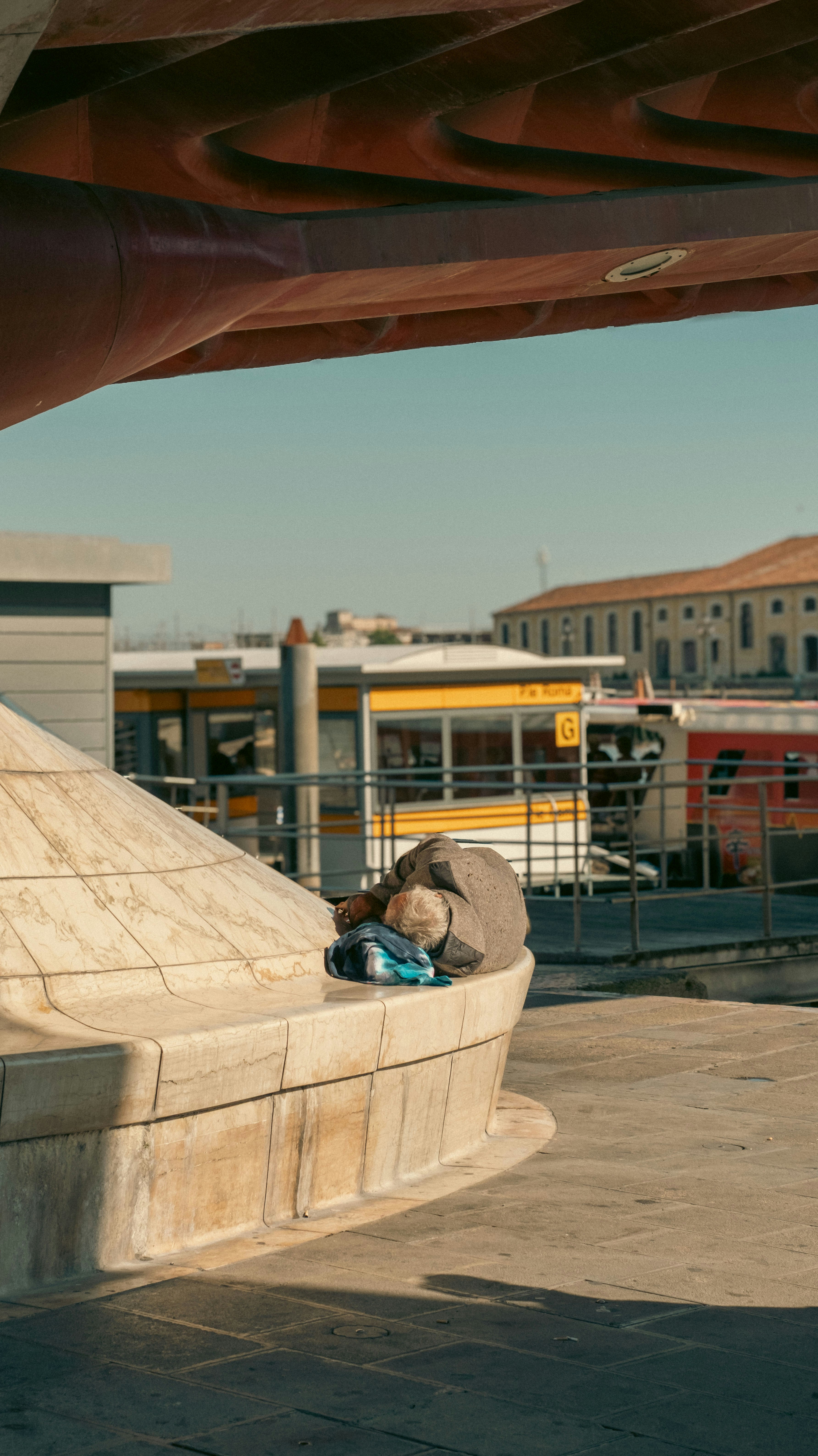 Resting Beneath Urban Shadows
