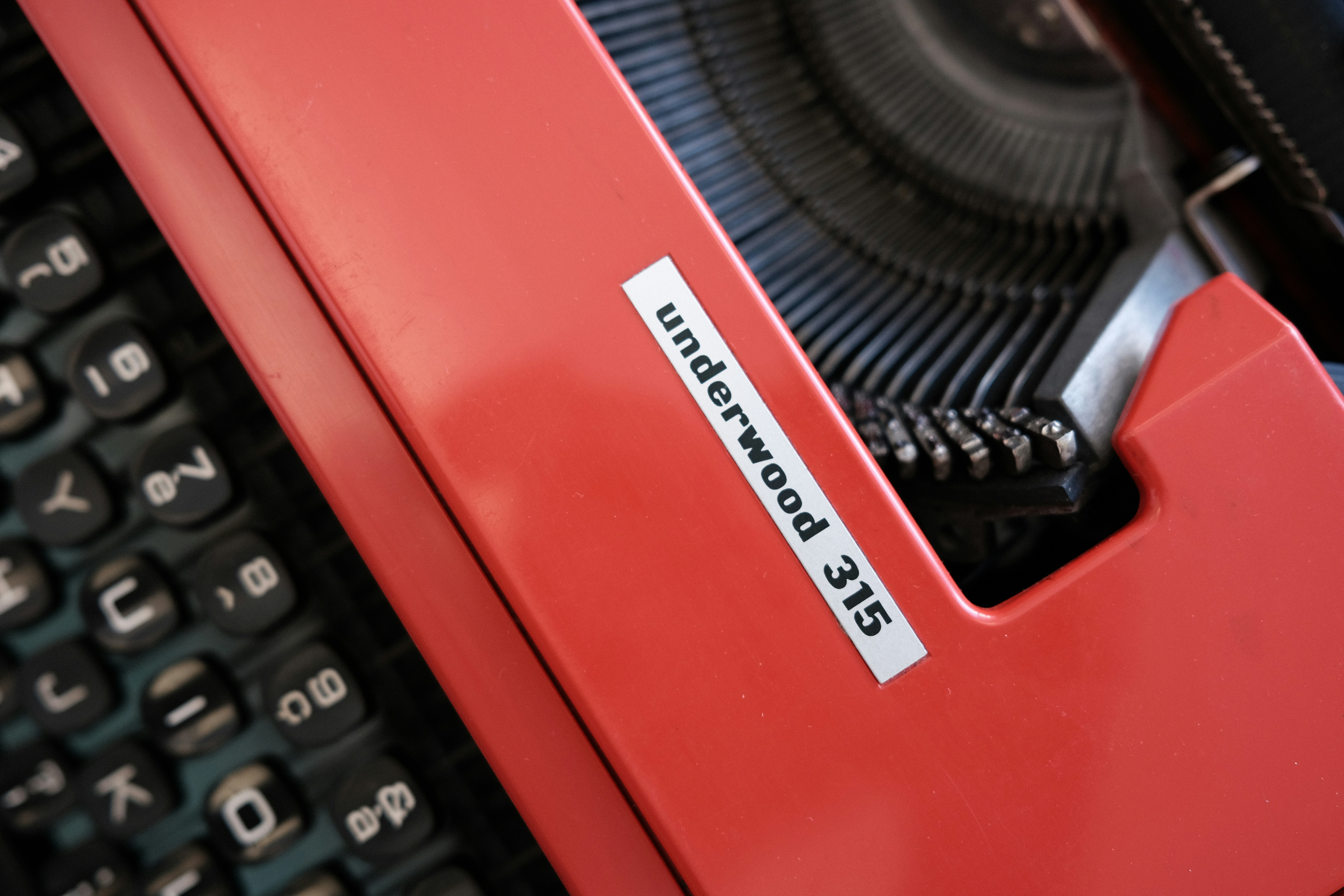 A close-up shows an underwood typewriter.