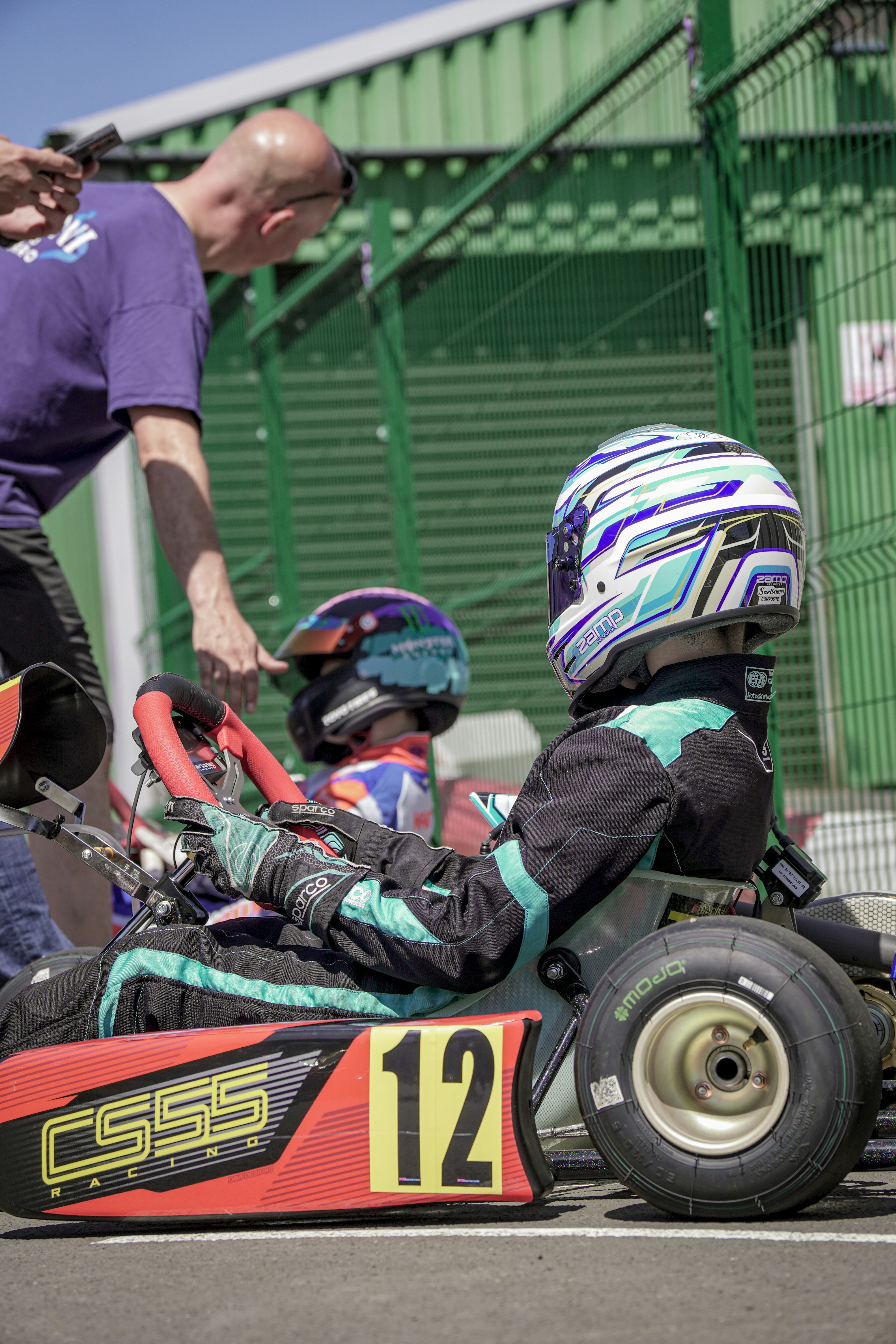 Two go-kart racers in helmets ready to race. photo – Free Car Image on ...