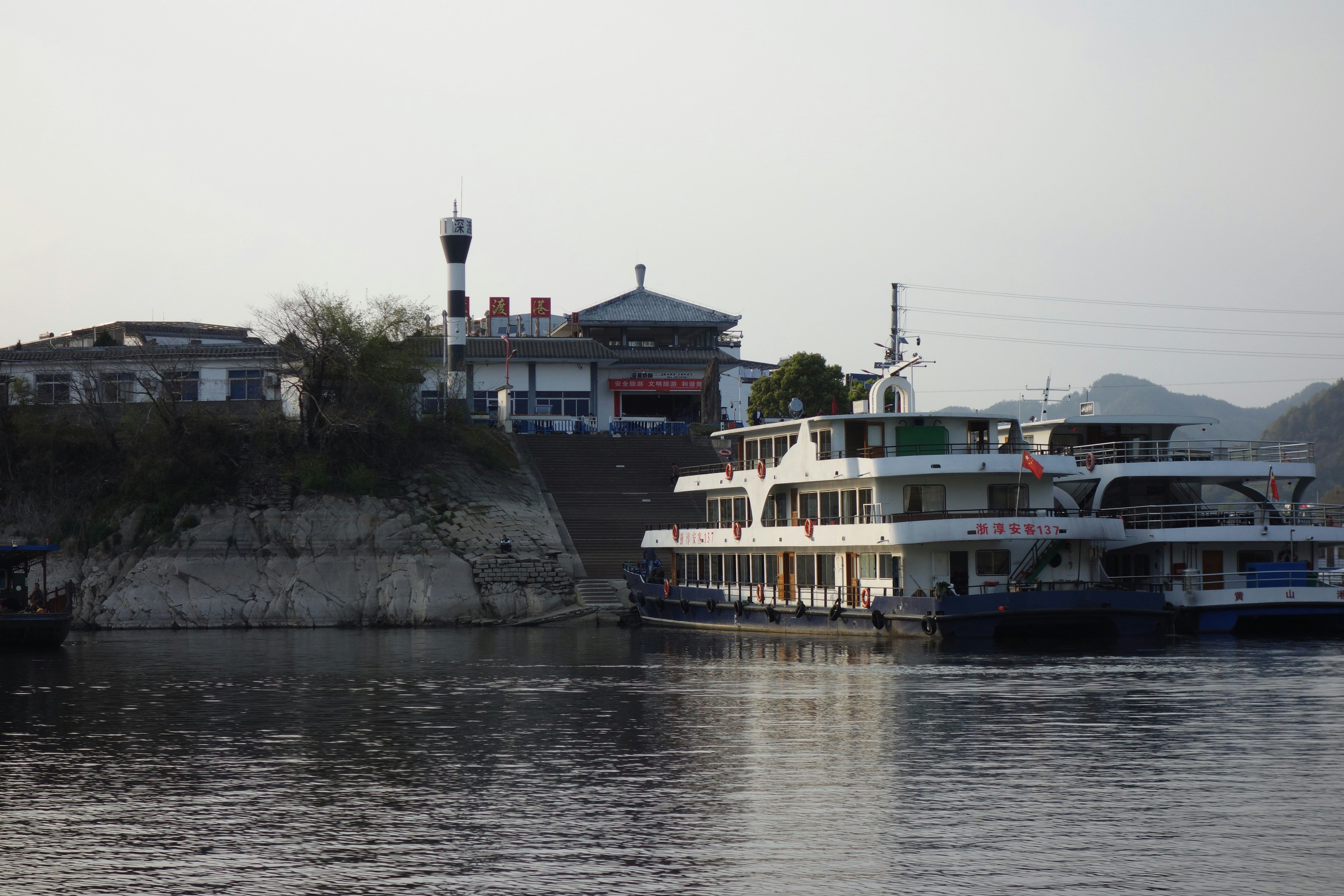 Harbor's Quiet Embrace: A Serene Dockside Scene