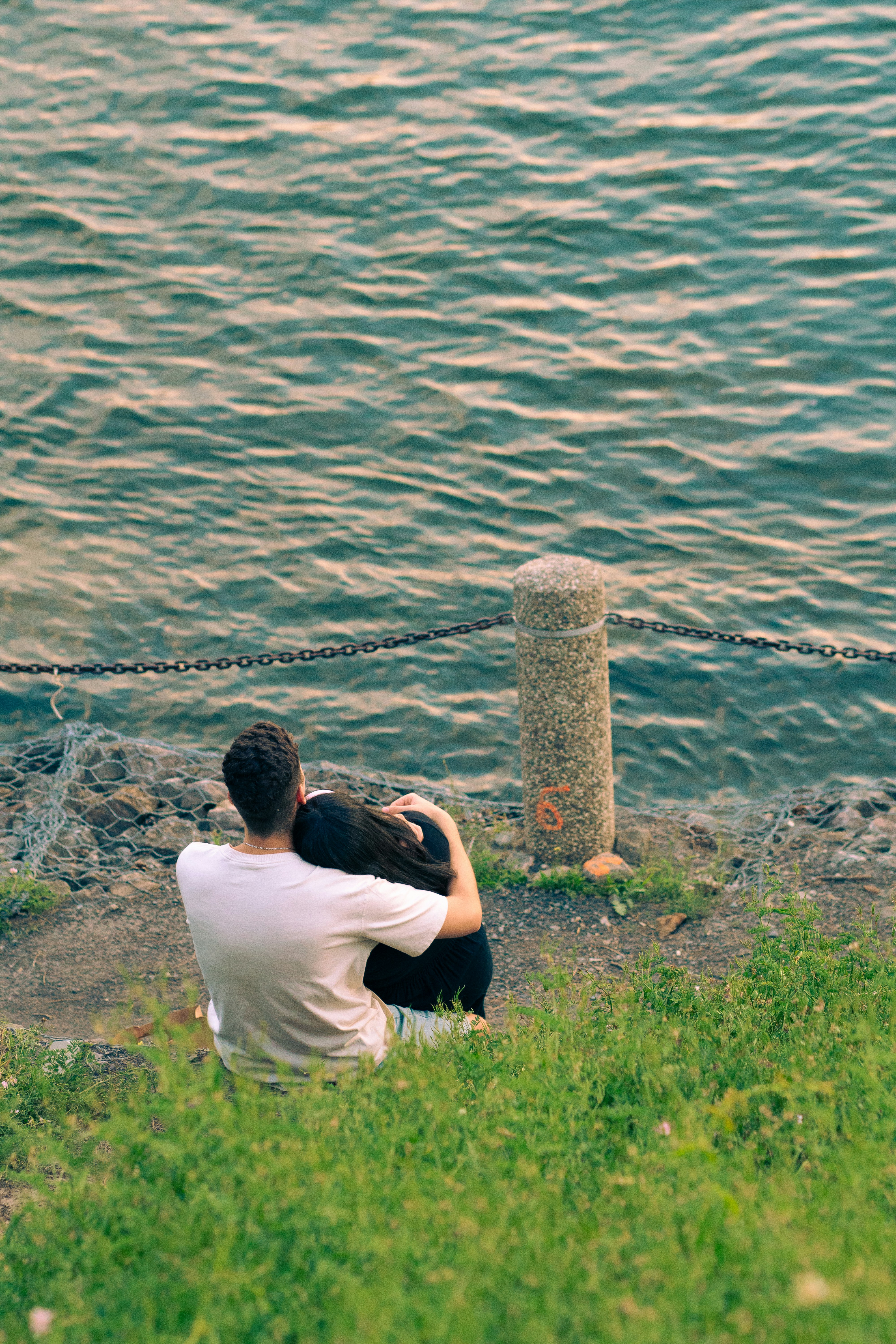 Embrace by the Water's Edge