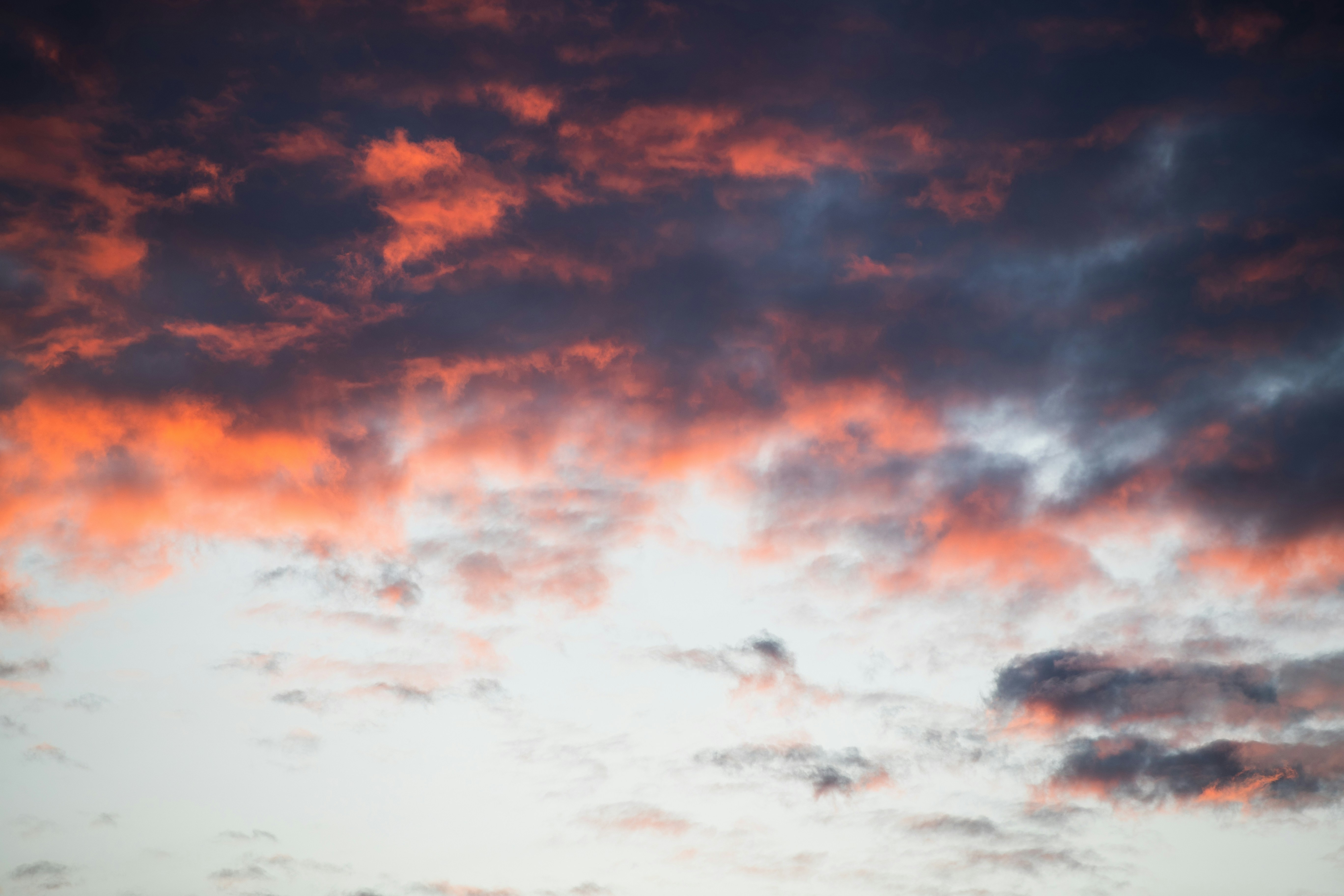 Dramatic sunset paints the sky with vibrant colors.