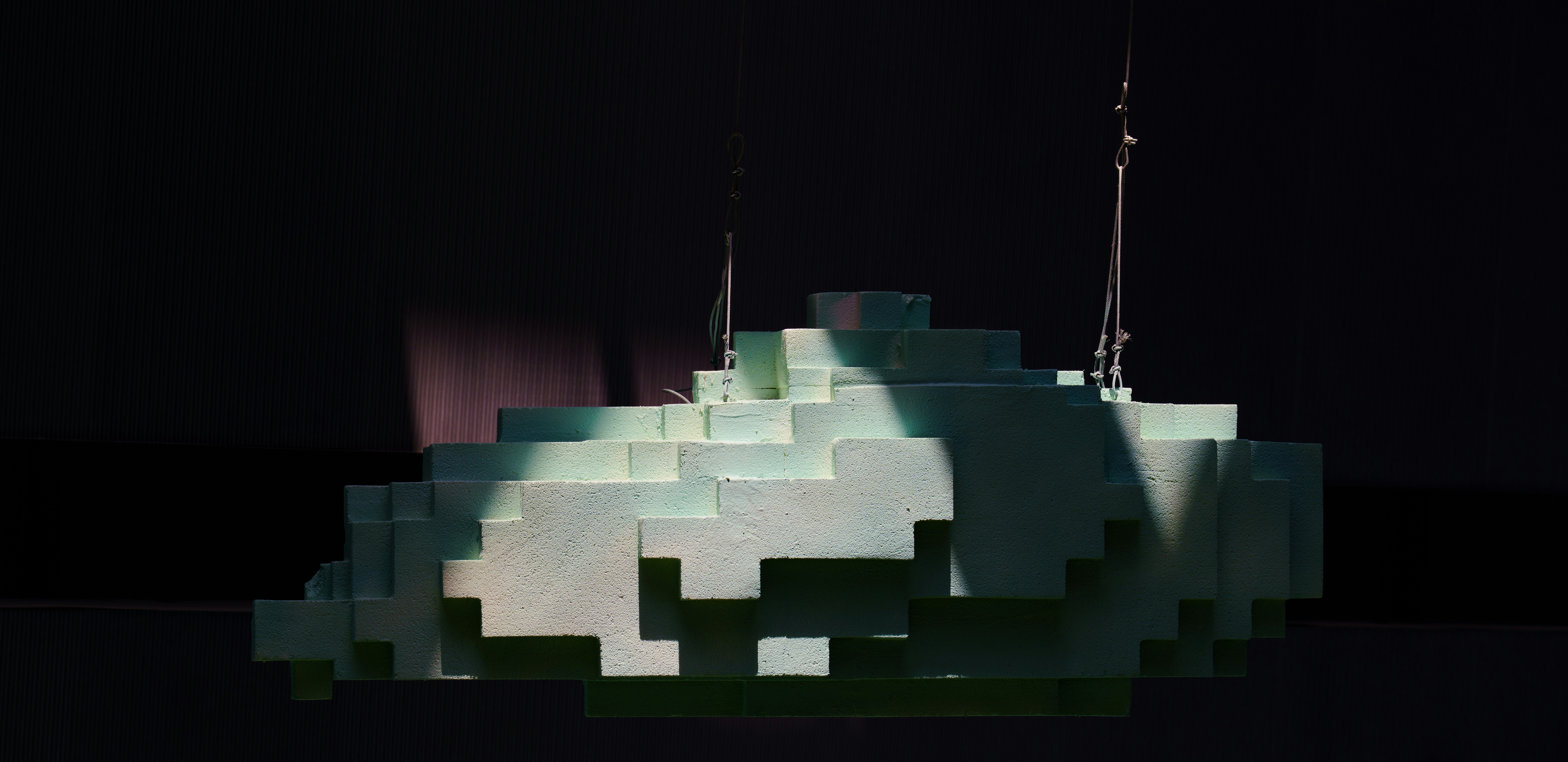Emerald Terraces Under a Narrow Spotlight