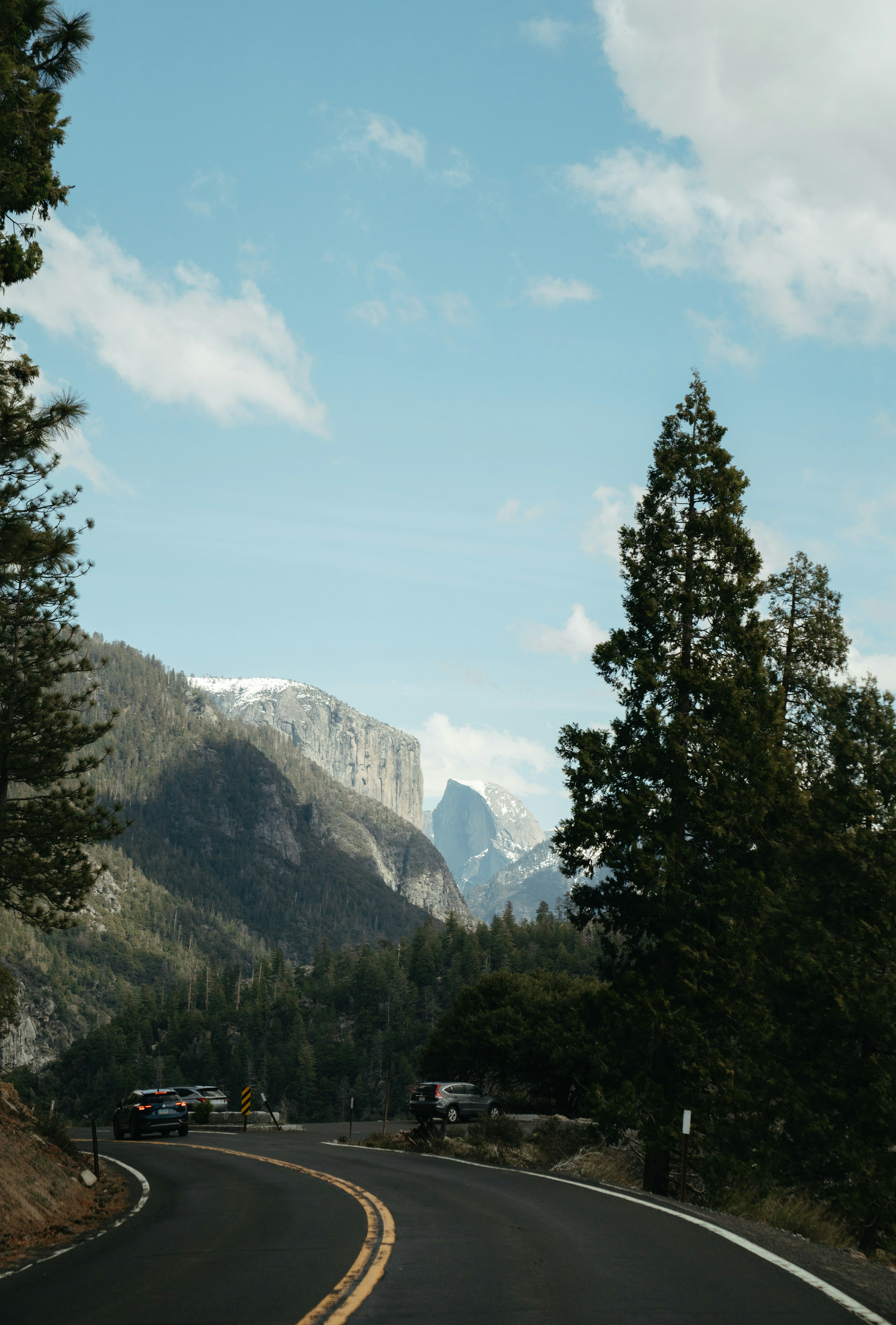 Scenic mountain view from a winding road.