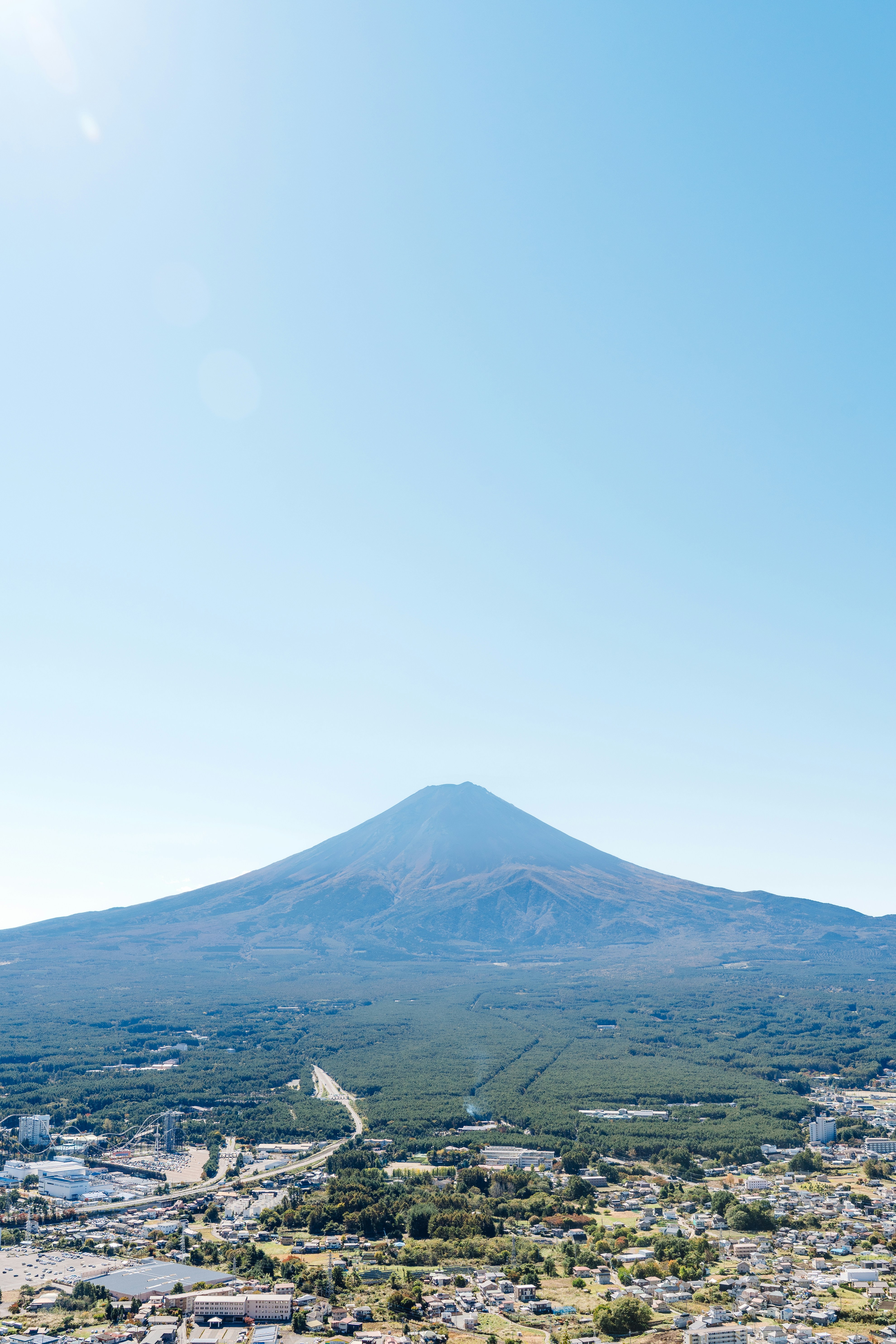 Cone of Quiet: A Volcano Rising Over a Verdant Basin