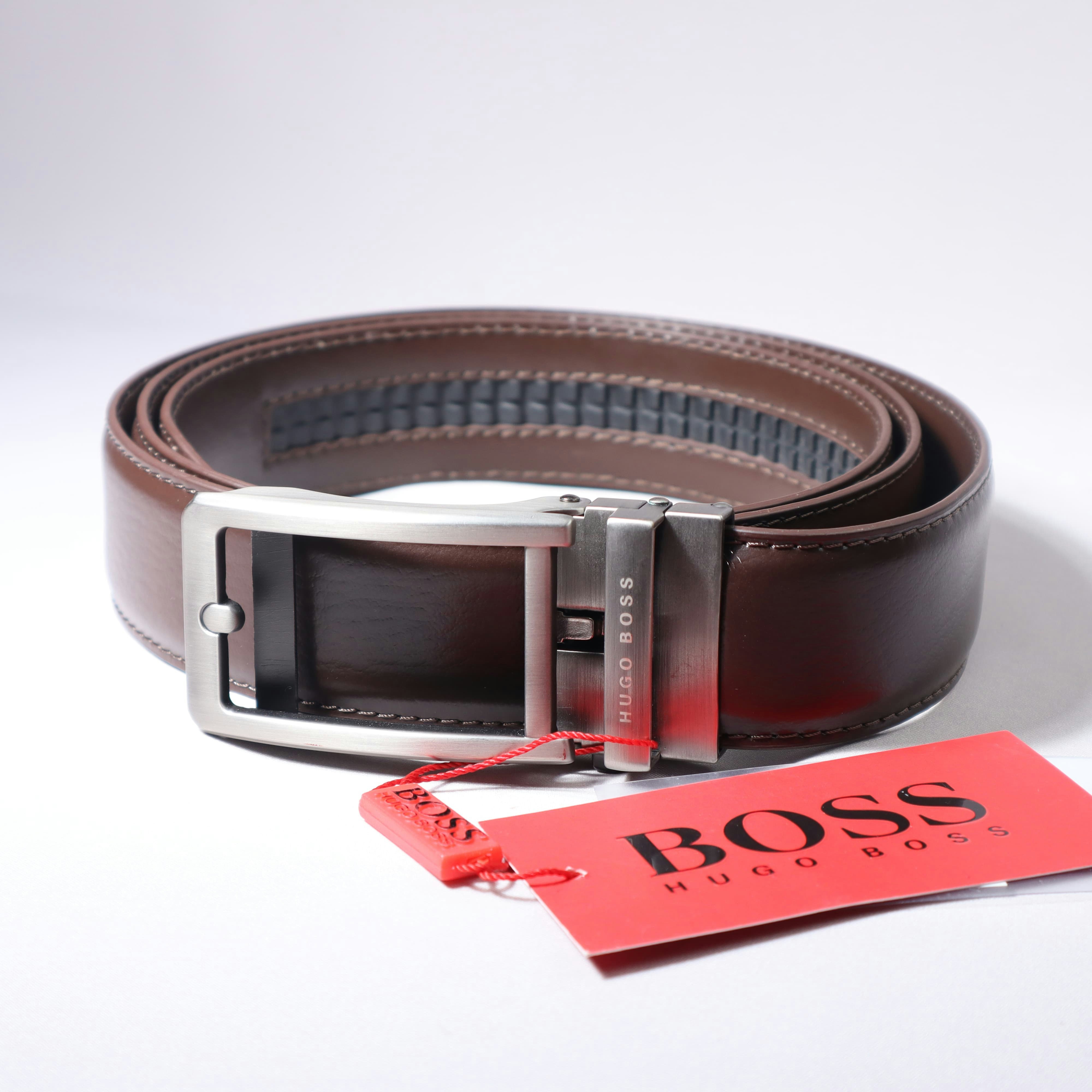 A brown boss belt with a metal buckle. photo – Free Belt Image on Unsplash