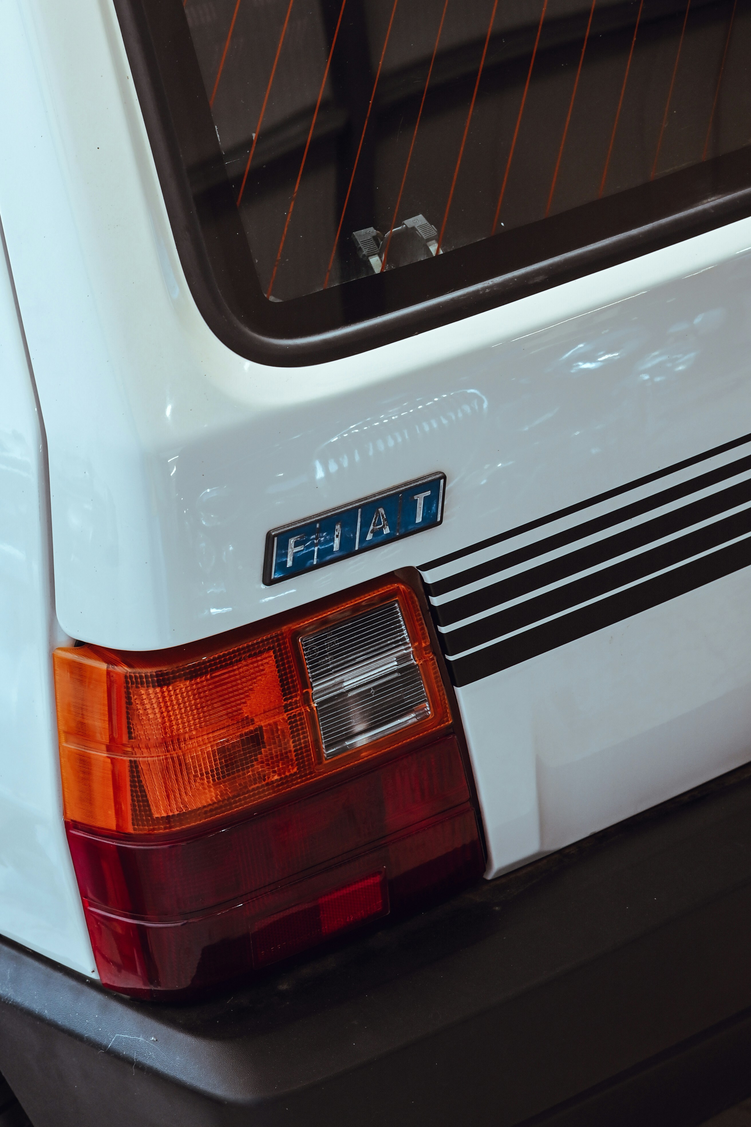 Cars & Coffee (Sat 12th July | A white fiat car's rear quarter is shown.