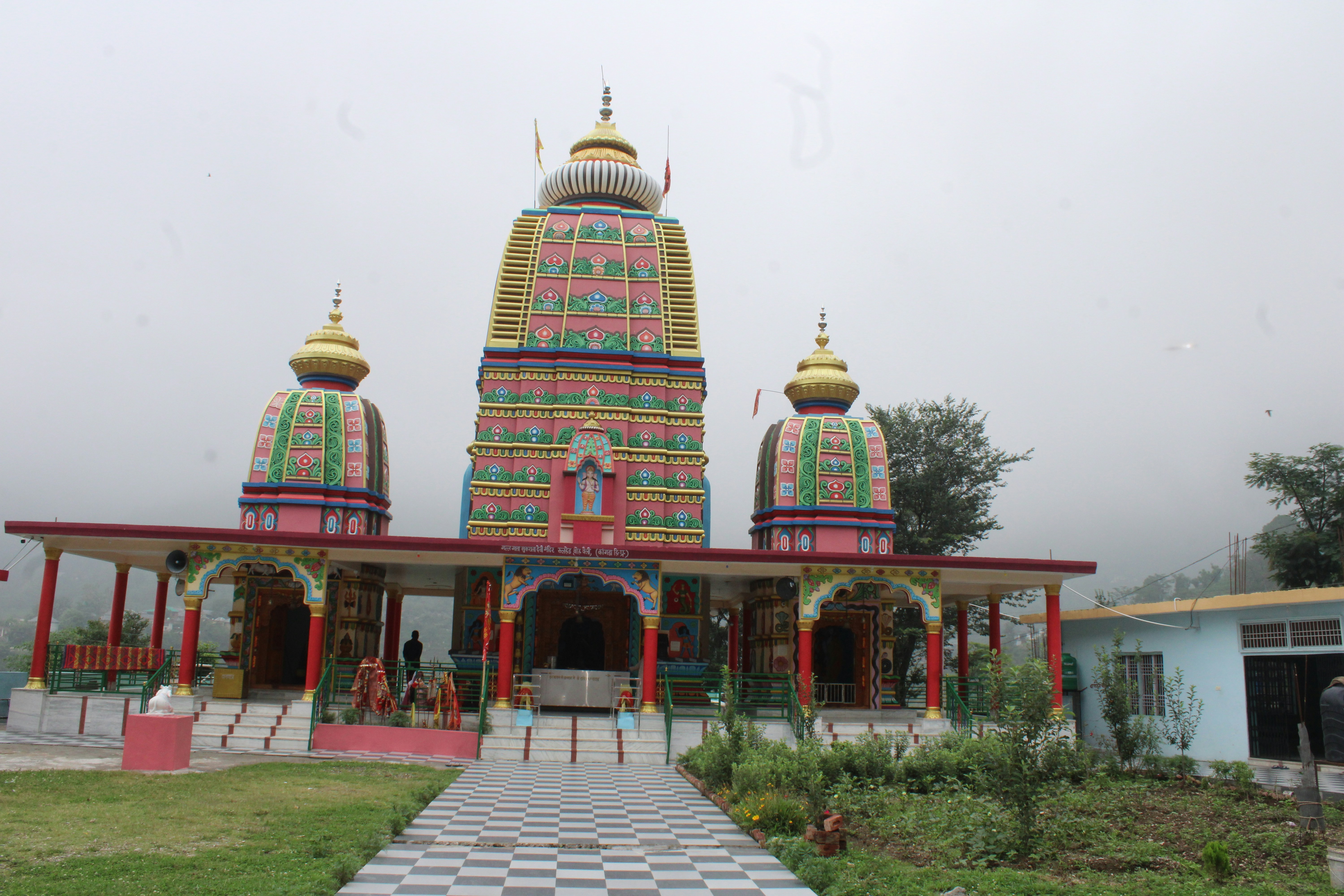 Sukrala mata mandir, Boh valley, Kangra, Himachal Pradesh. | A colorful hindu temple stands proudly outdoors.
