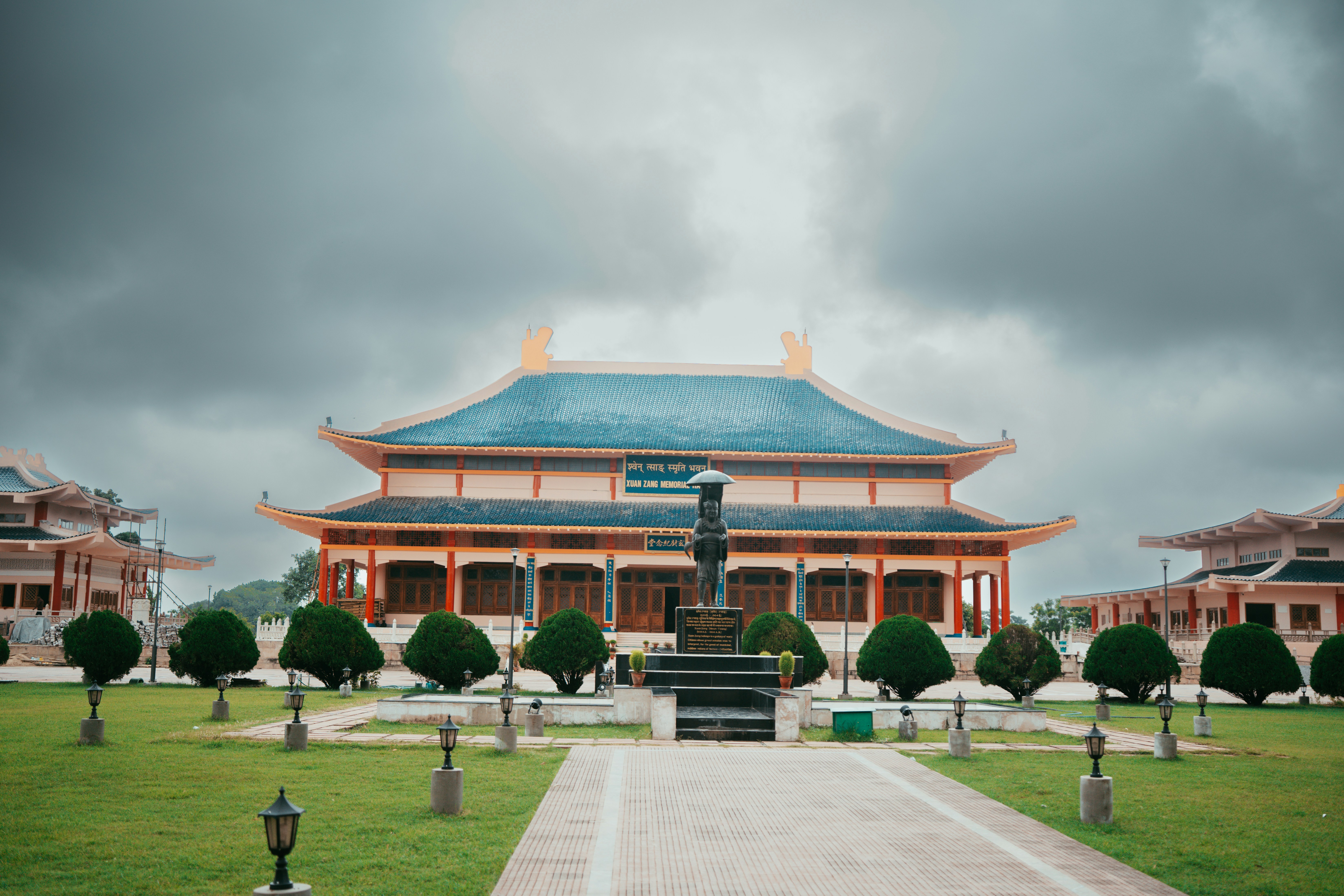 Symmetry and Statues: A Chinese Palace Courtyard Under a Dramatic Sky