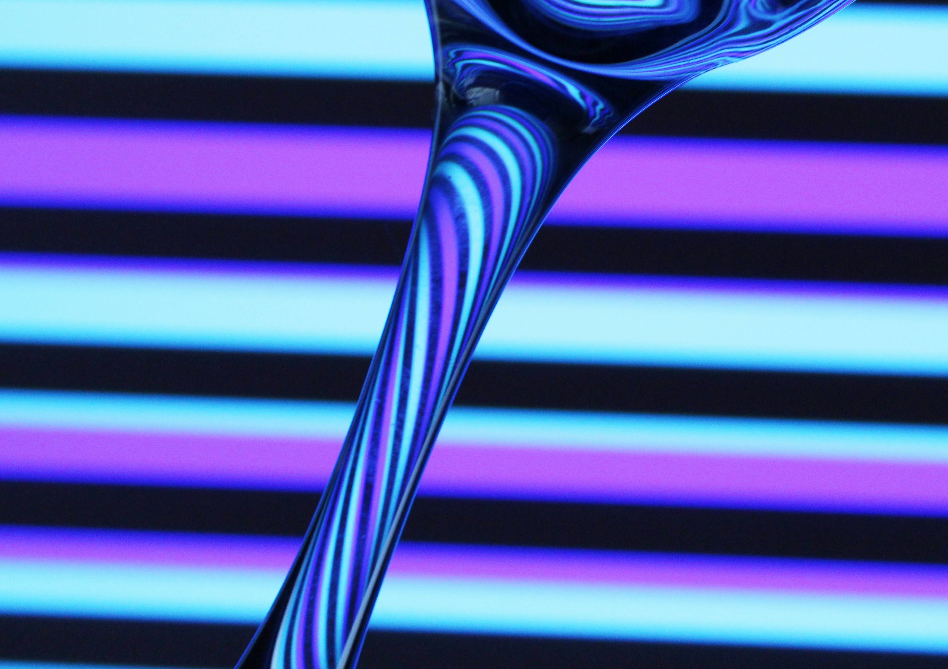 Reflections of Light: A Spoon's Dance with Color