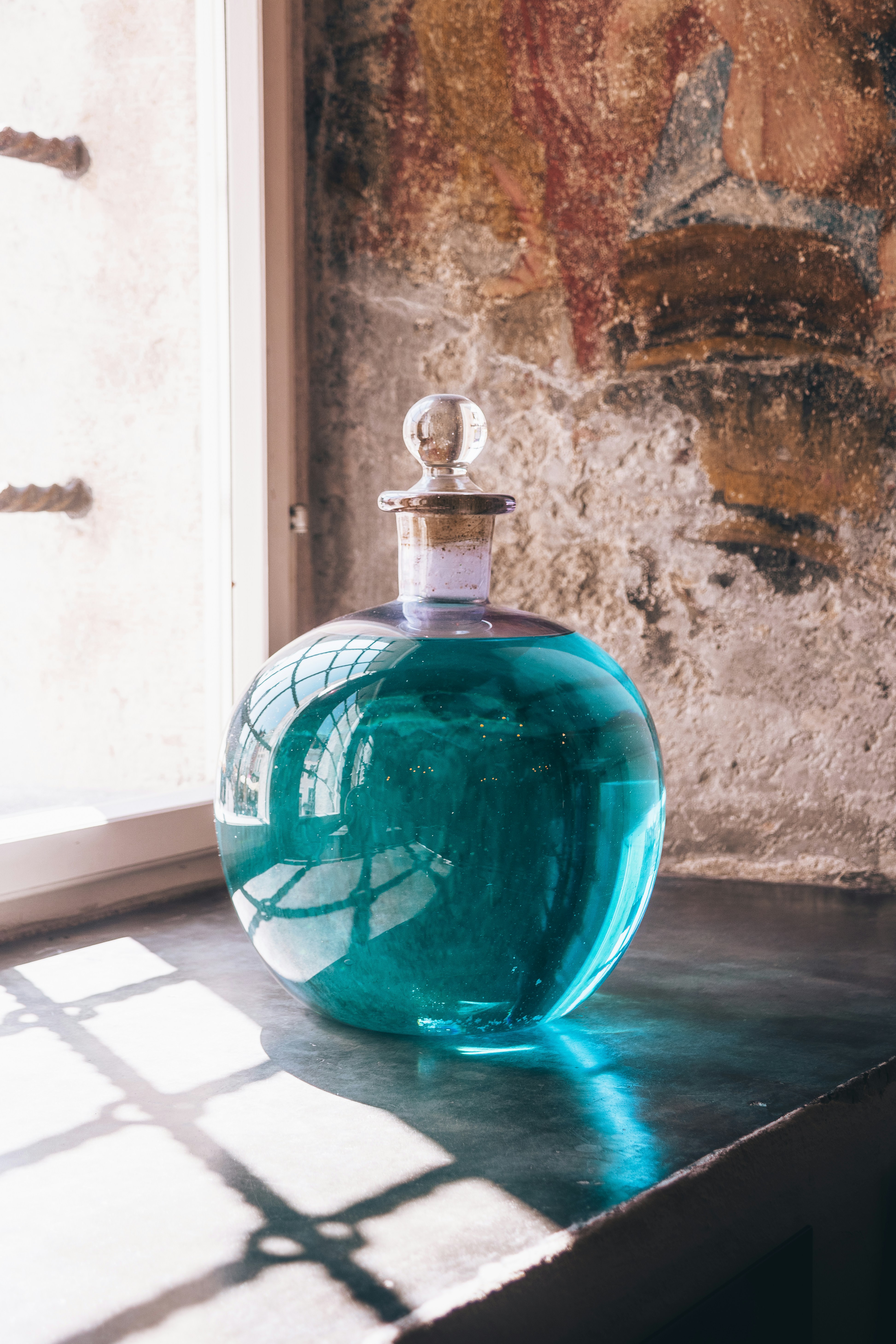 The Enigmatic Elixir: A Study in Glass and Light