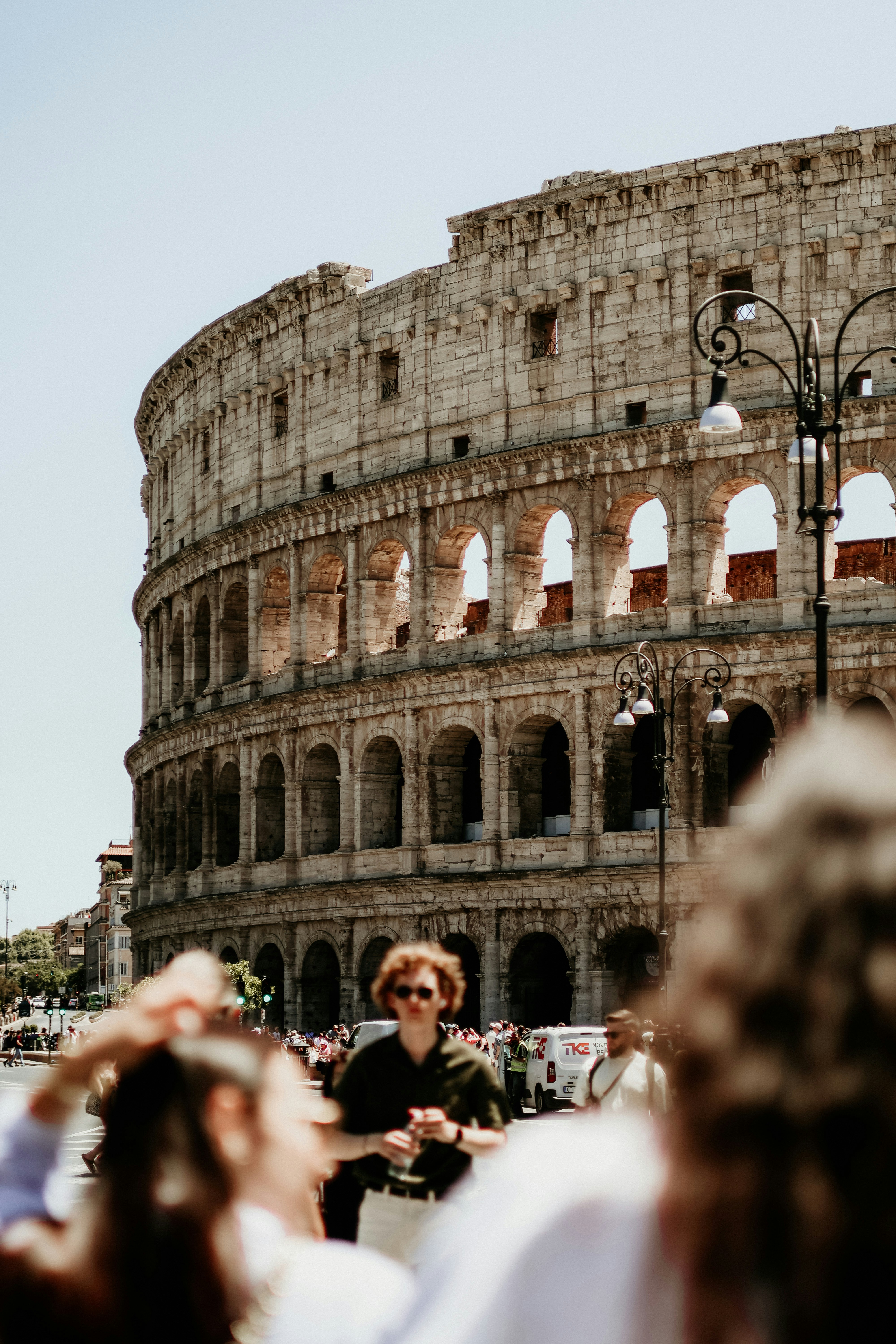 Tourists gather in front of the roman colosseum. photo – Free ...