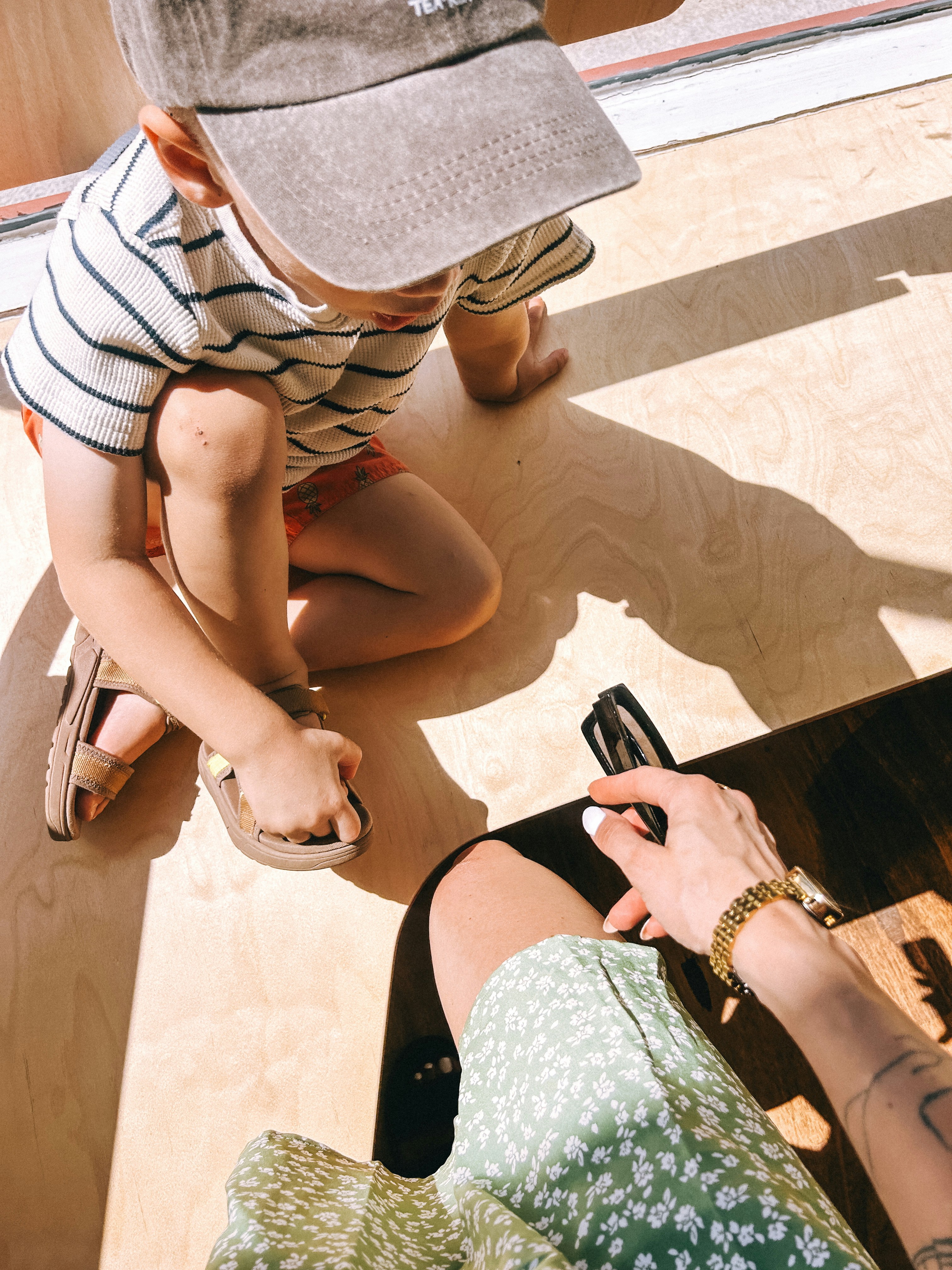 Sunlit Footwear Exchange: A Small Moment in the Shadows