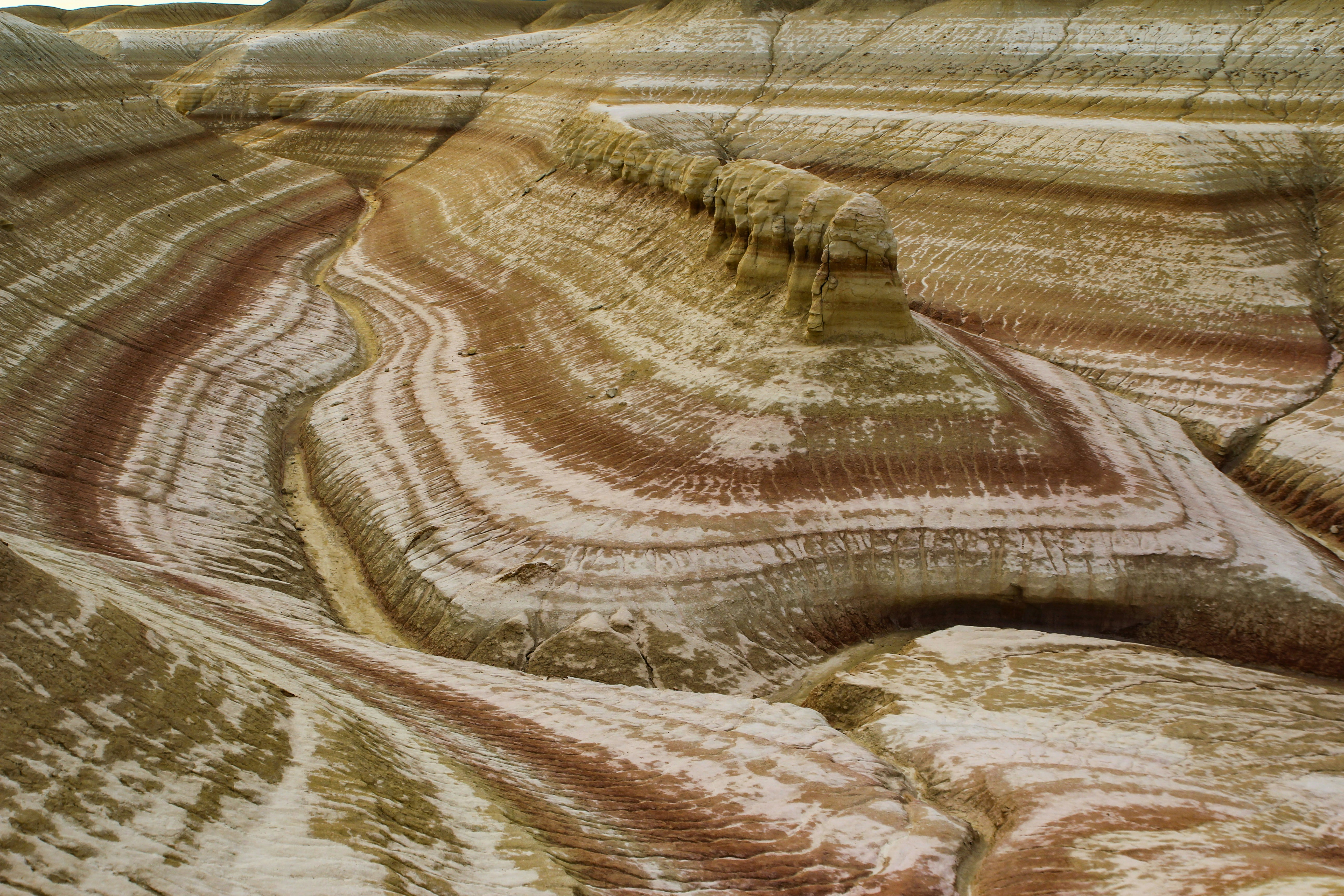 Layered rock formations with beautiful colors.