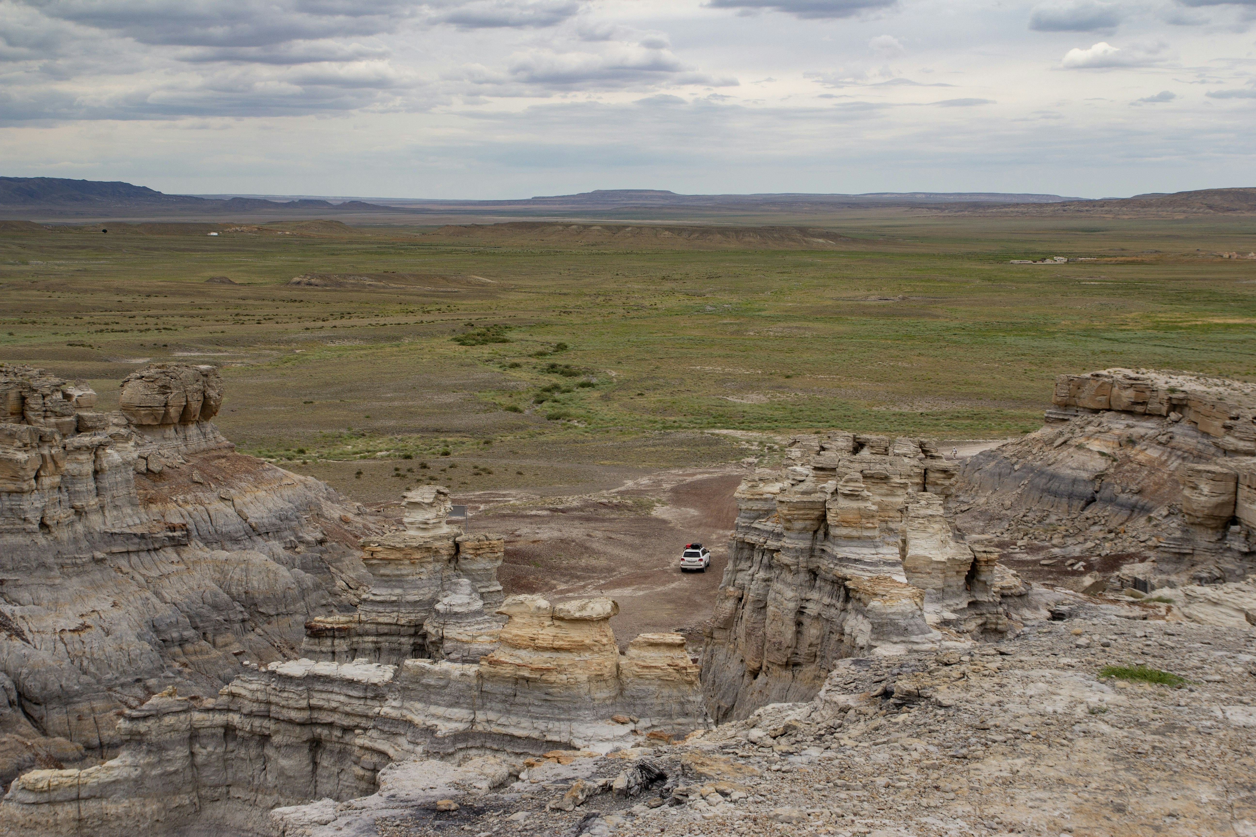Stone Skiffs Among Prairie Spires