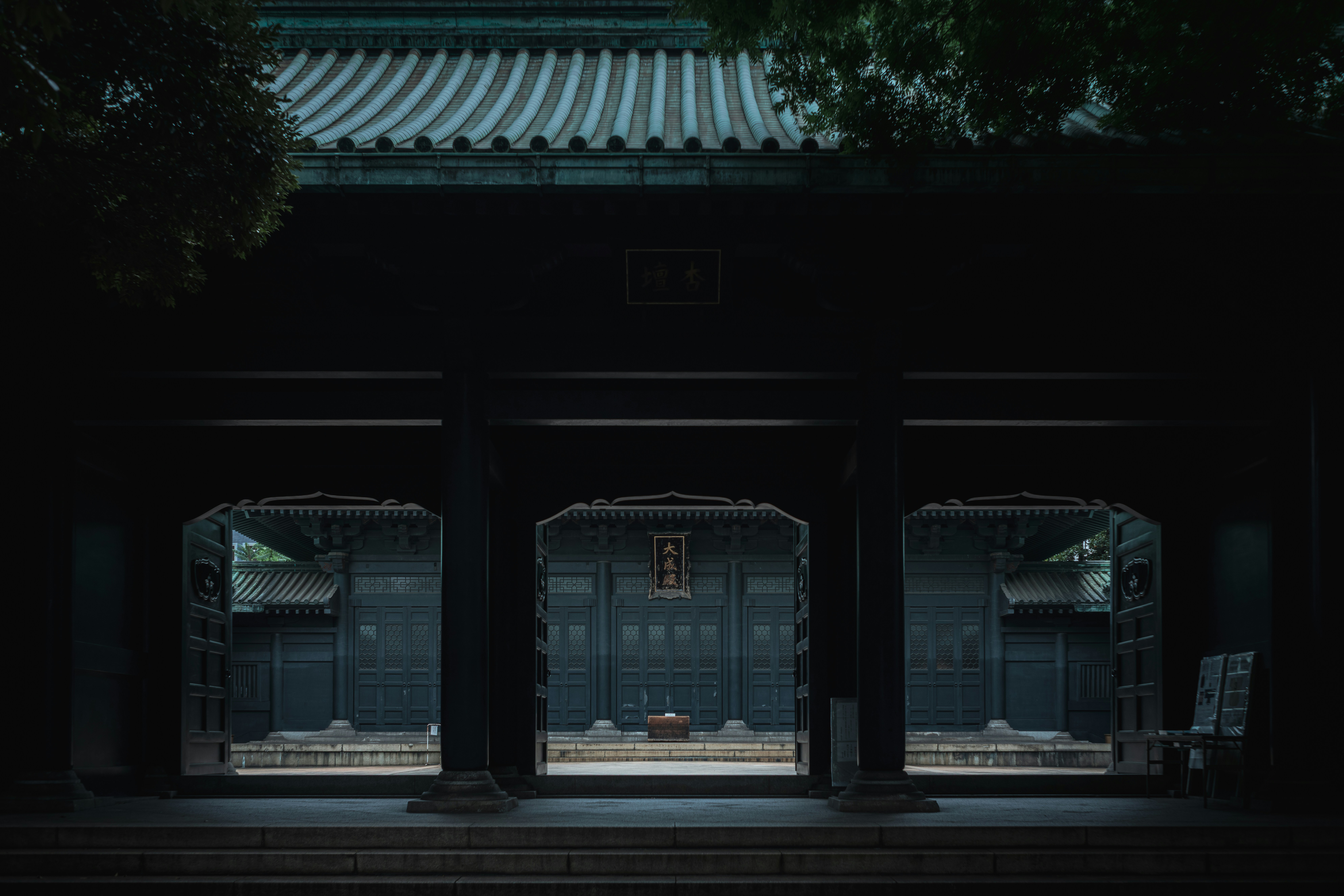 A dark, intimate shot of a japanese temple.