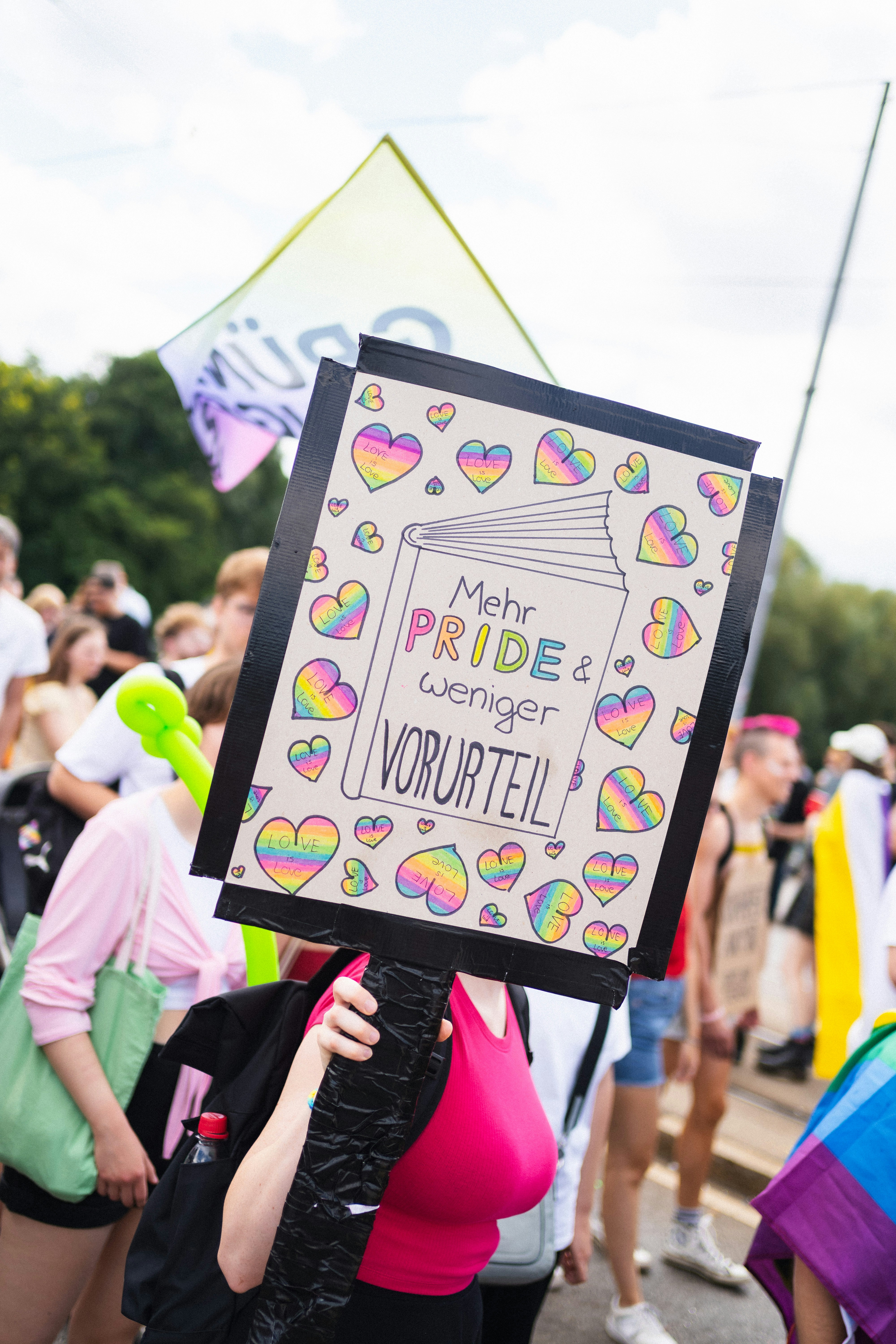 Pride sign calls for more pride and less prejudice. photo – Free Munich ...