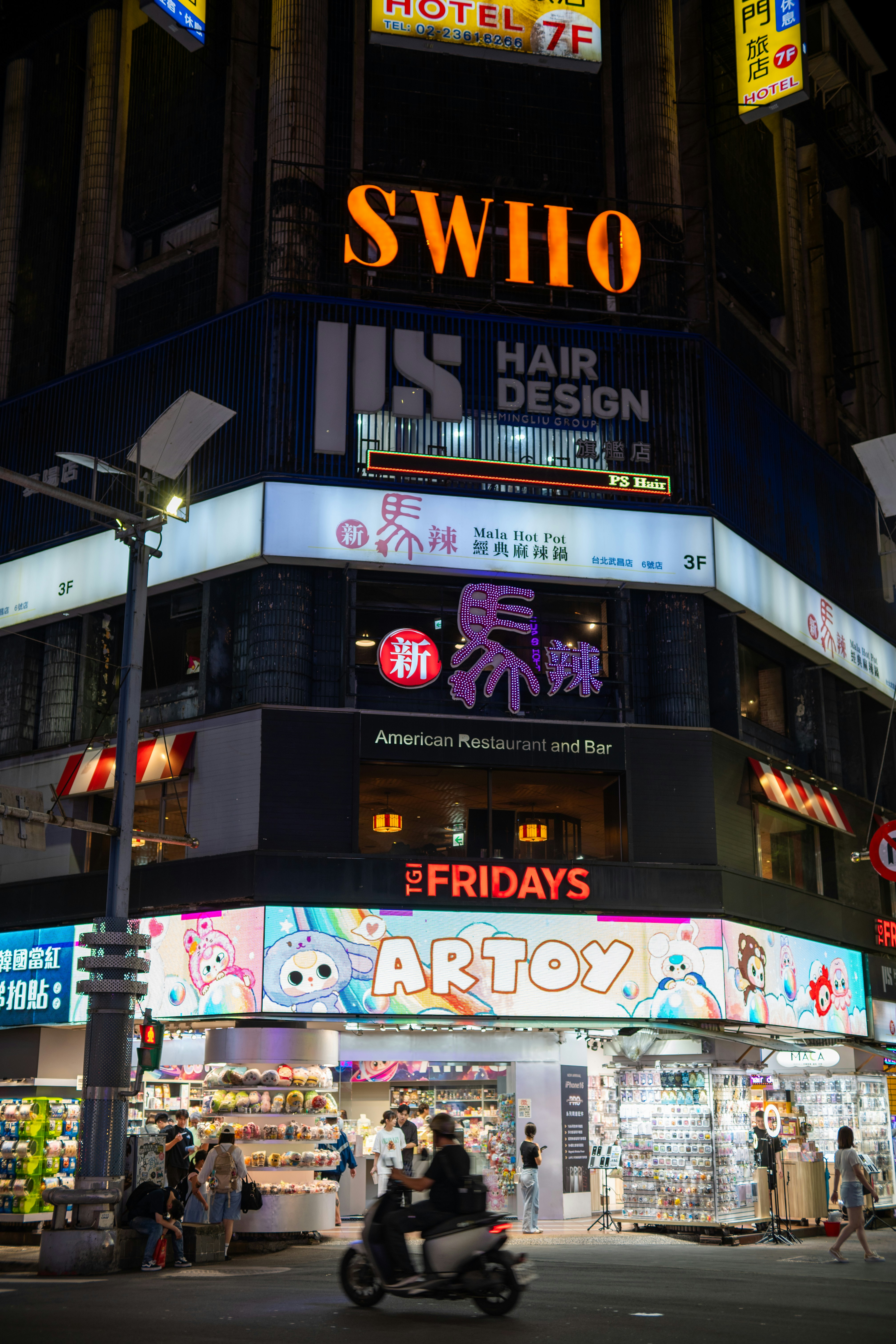 Urban Canvas: A Nighttime Mosaic of Culture and Commerce