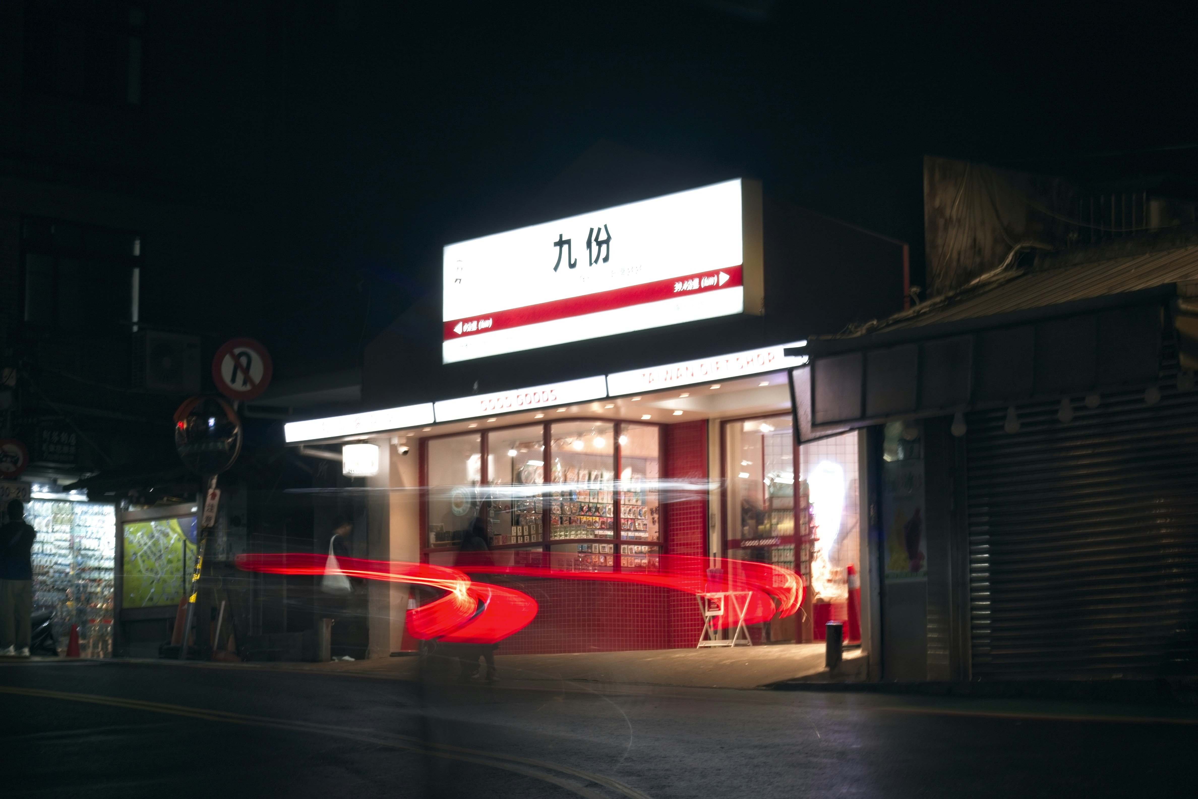 Neon Glow at Twilight: A Corner Shop's Nightlife