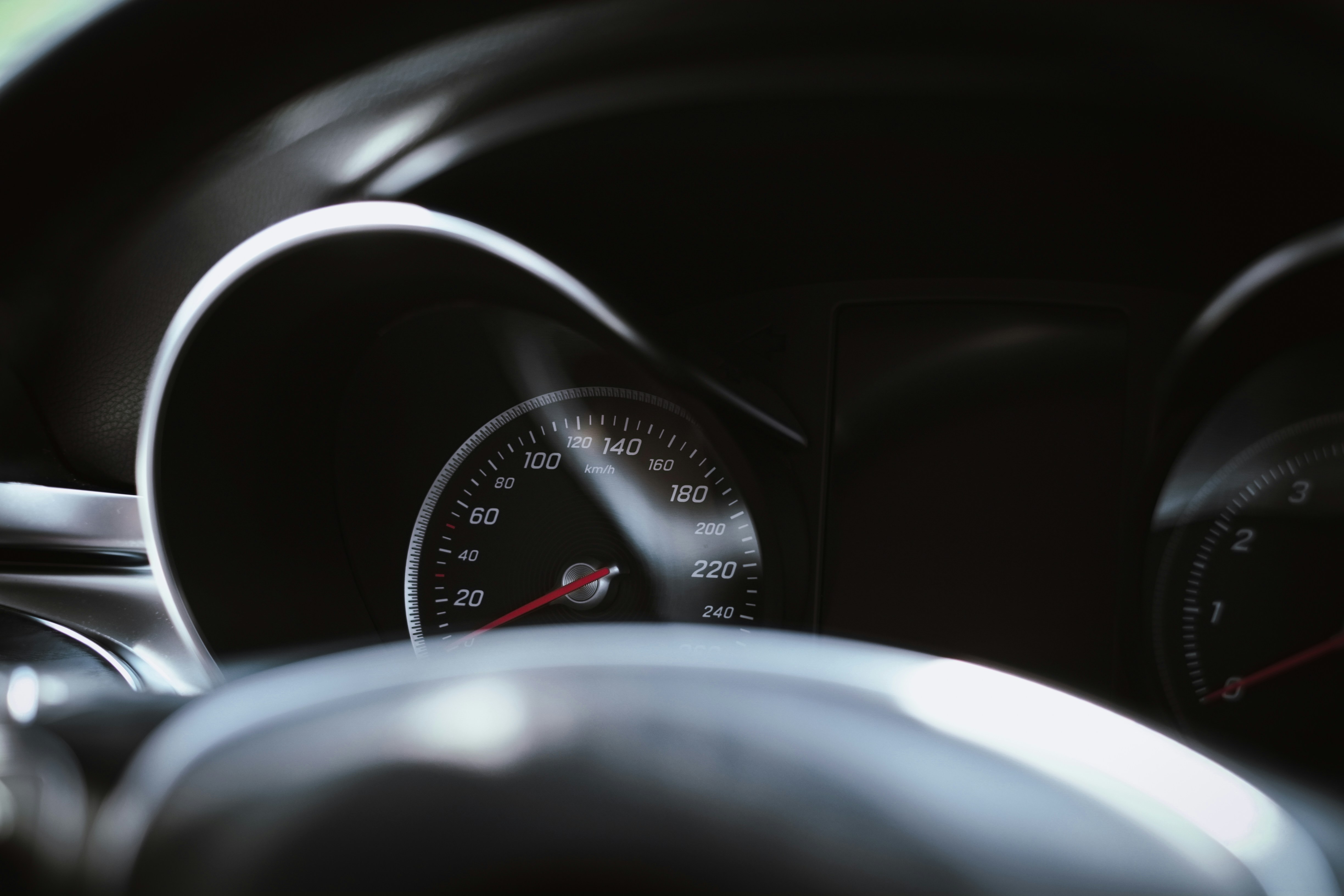 A car's dashboard speedometer is shown. photo – Free Car Image on Unsplash
