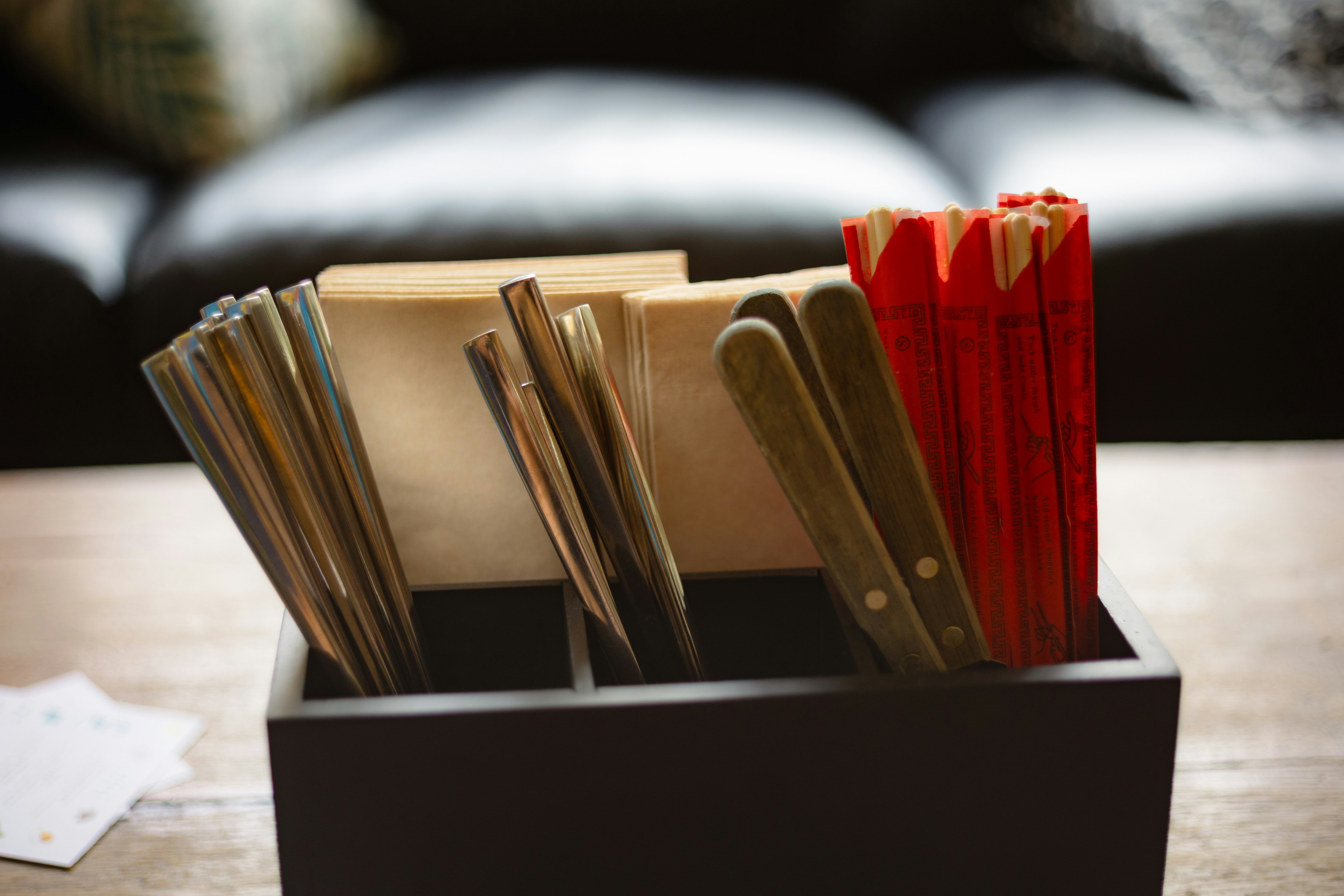 Utensils and fortune sticks in a holder. photo – Free Book Image on ...