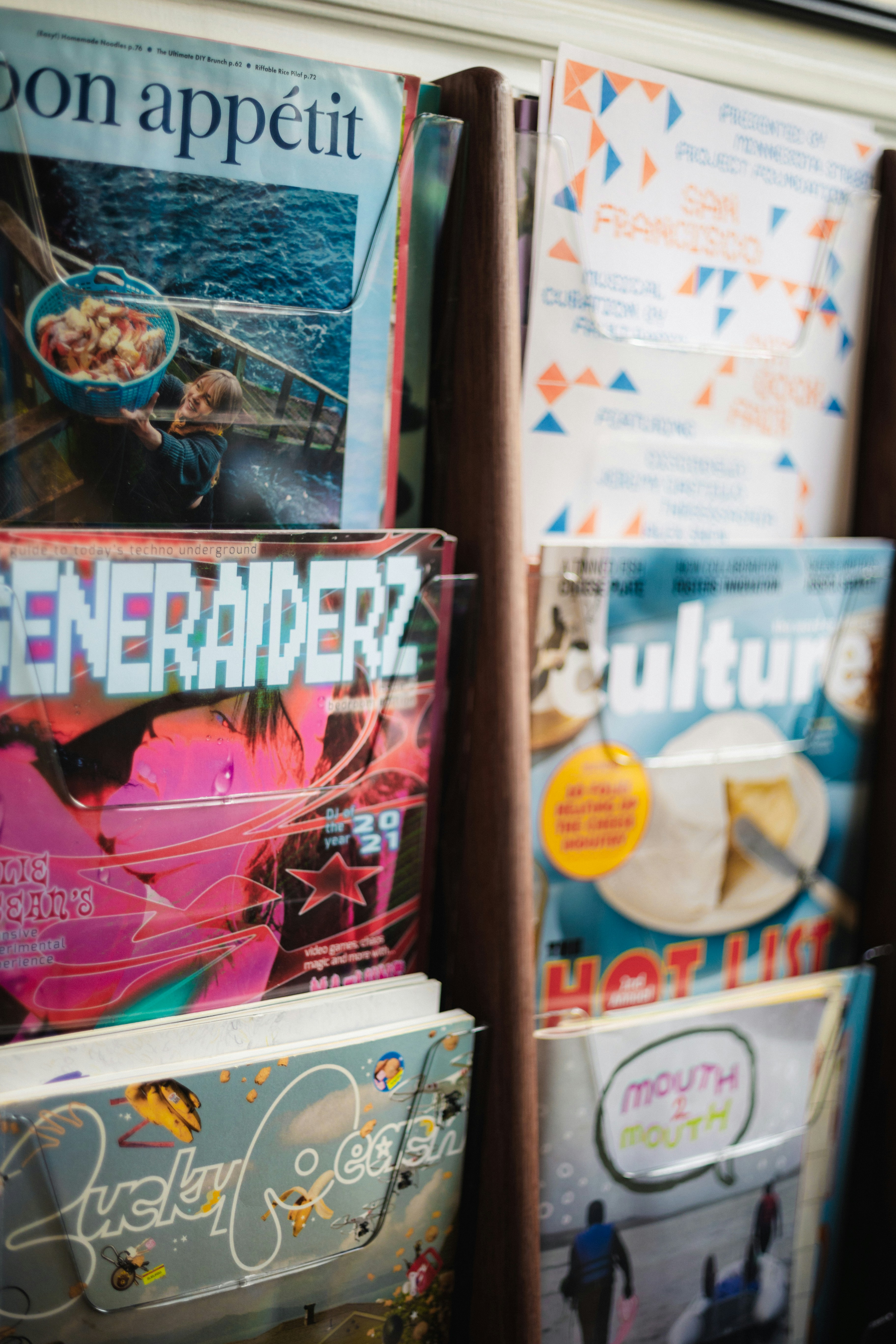 Comic Book Confetti: A Carousel of Colorful Magazines on a Newsstand
