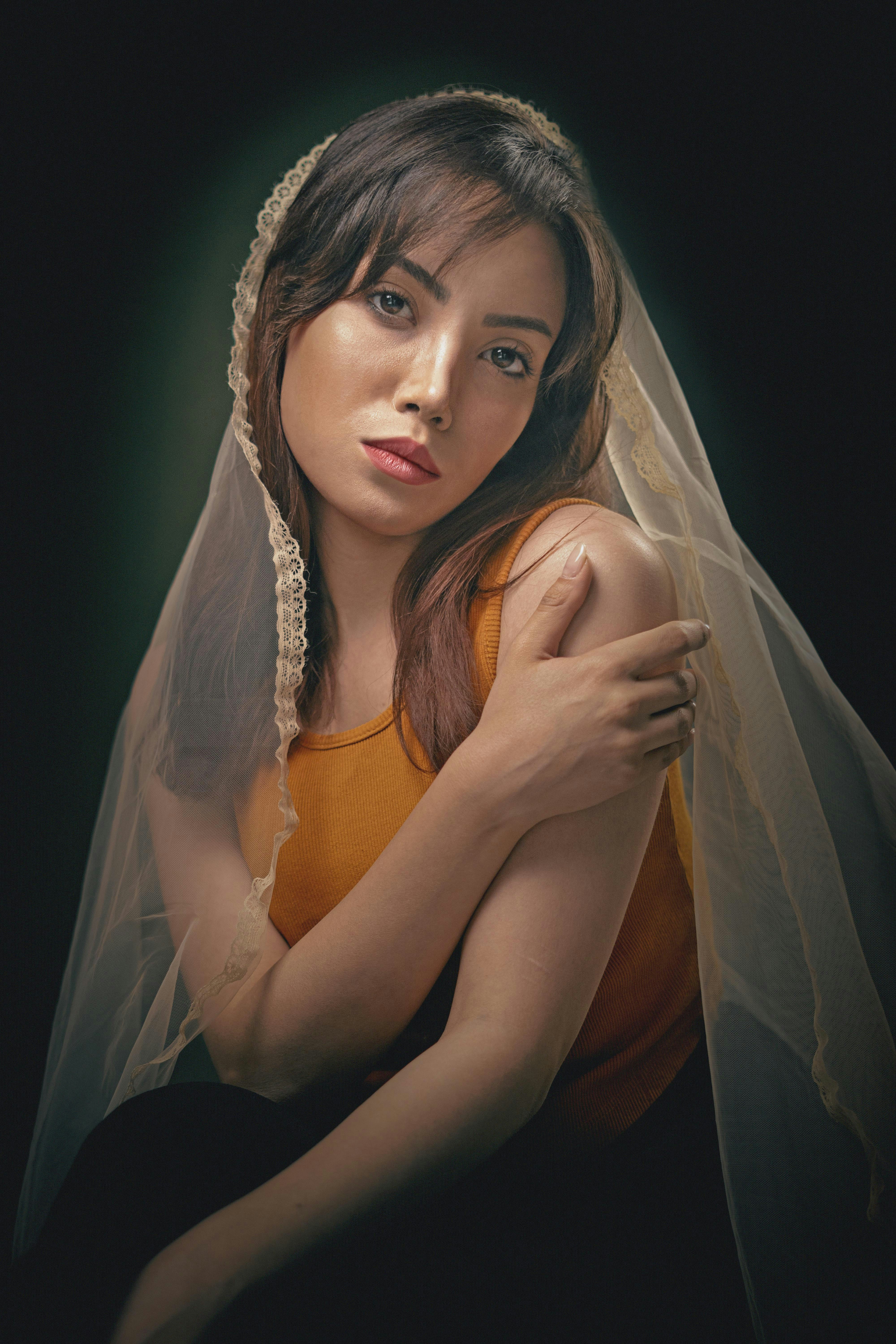 Veiled Elegance: A Portrait of Contemplation