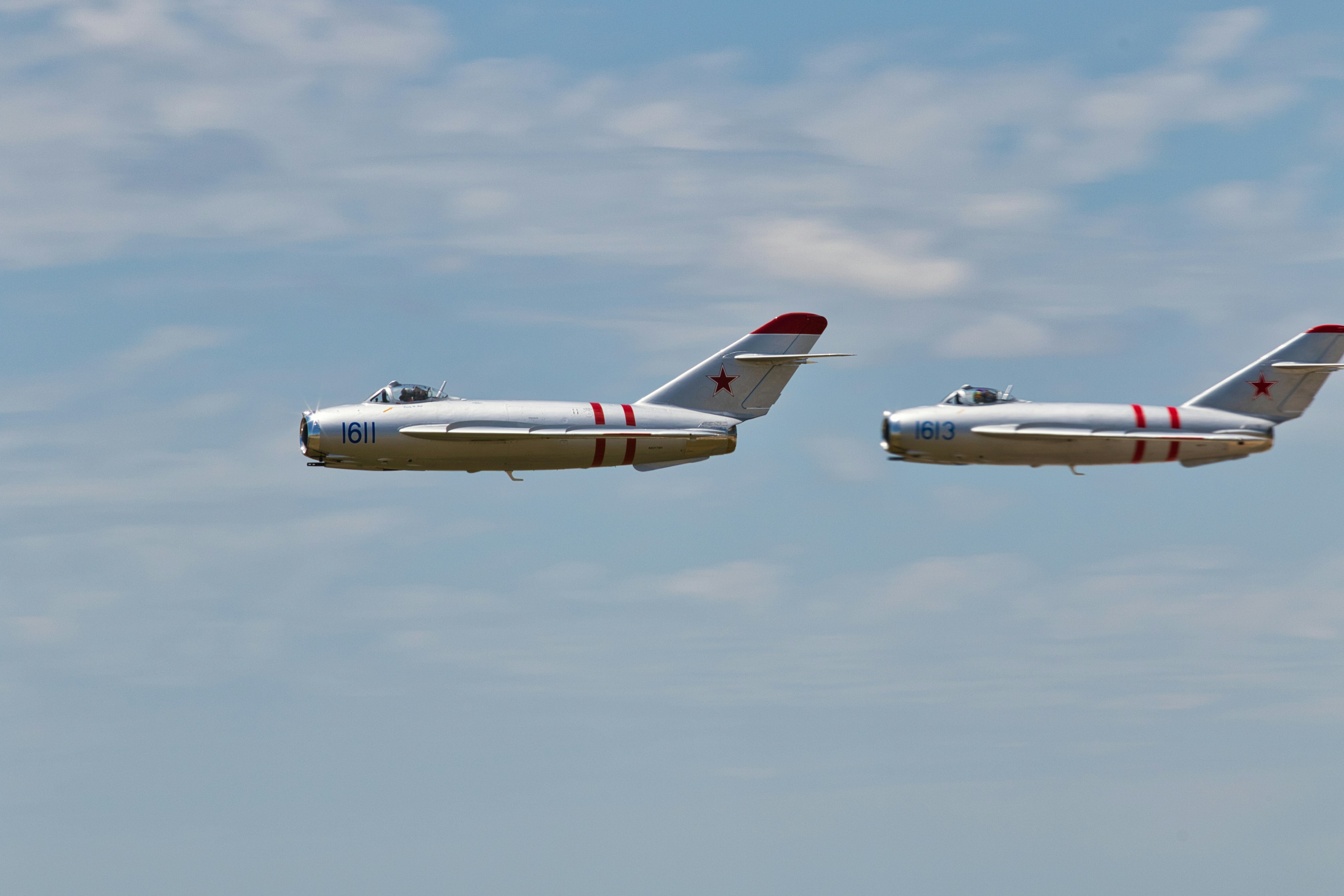 Two mig fighter jets fly across the sky. photo – Free Japan Image on ...