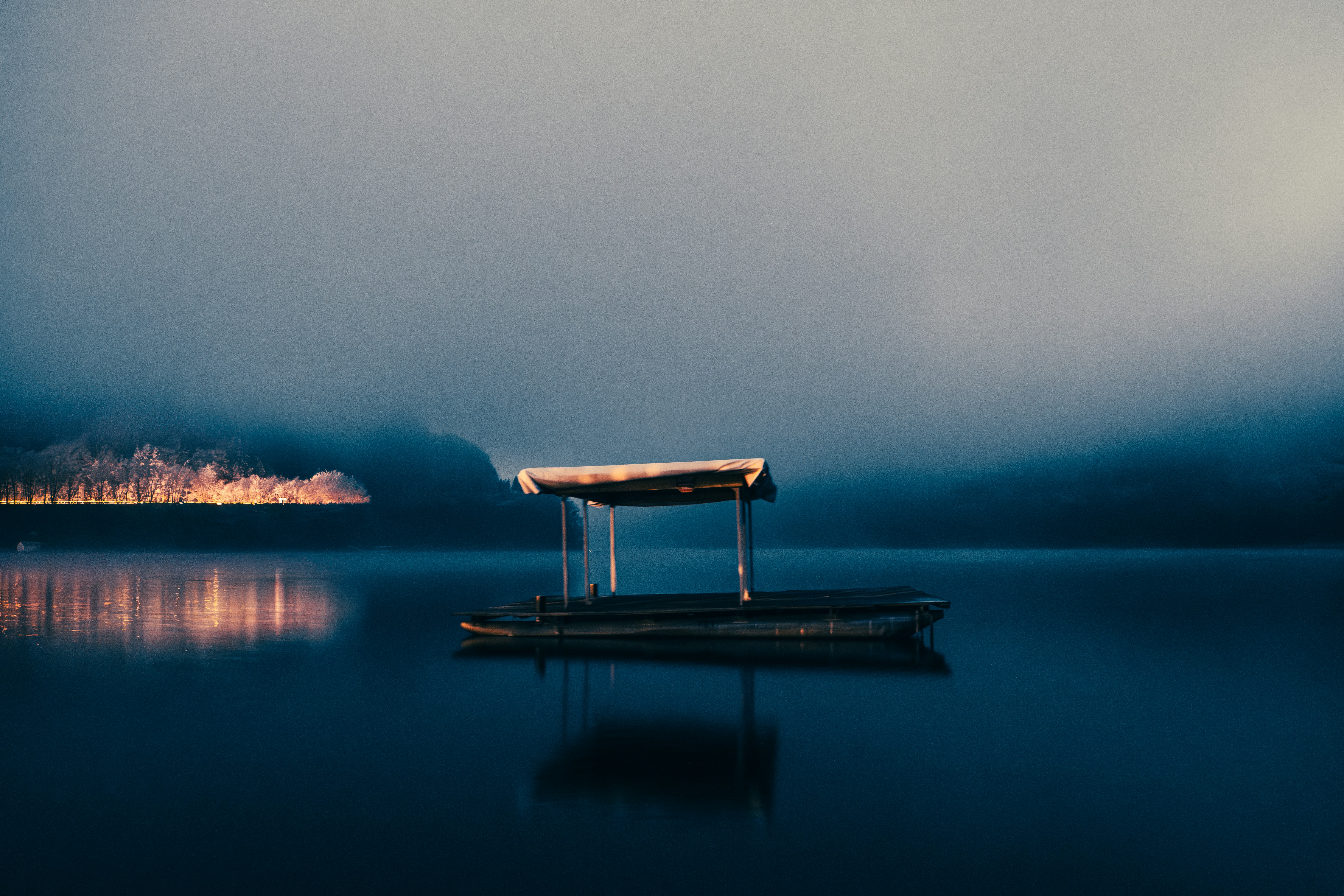 One of my fav photos from January 🥹❤️ | A boat sits serene on calm water.
