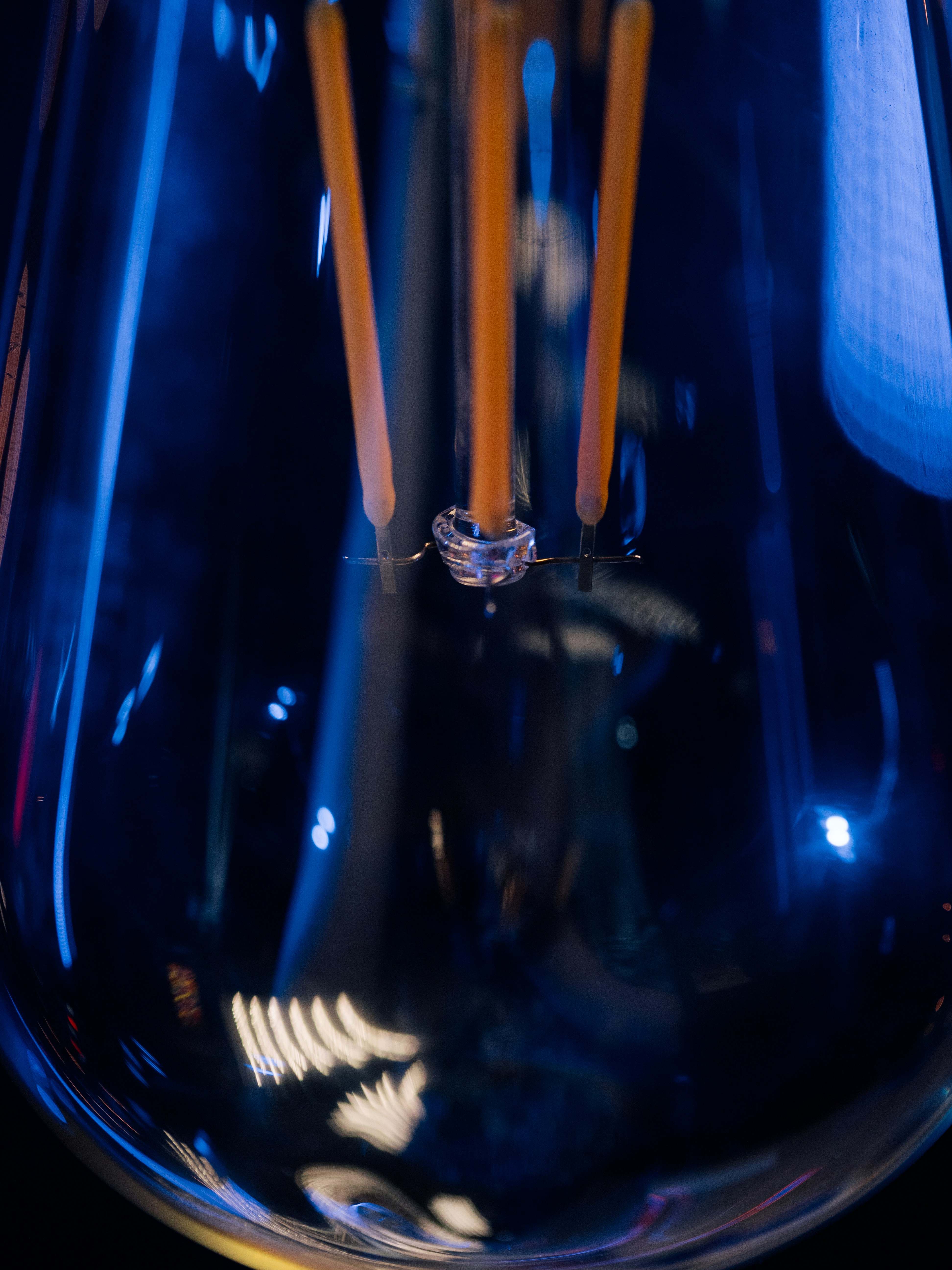 Filament Echo: A Blue Edison Bulb Close-Up