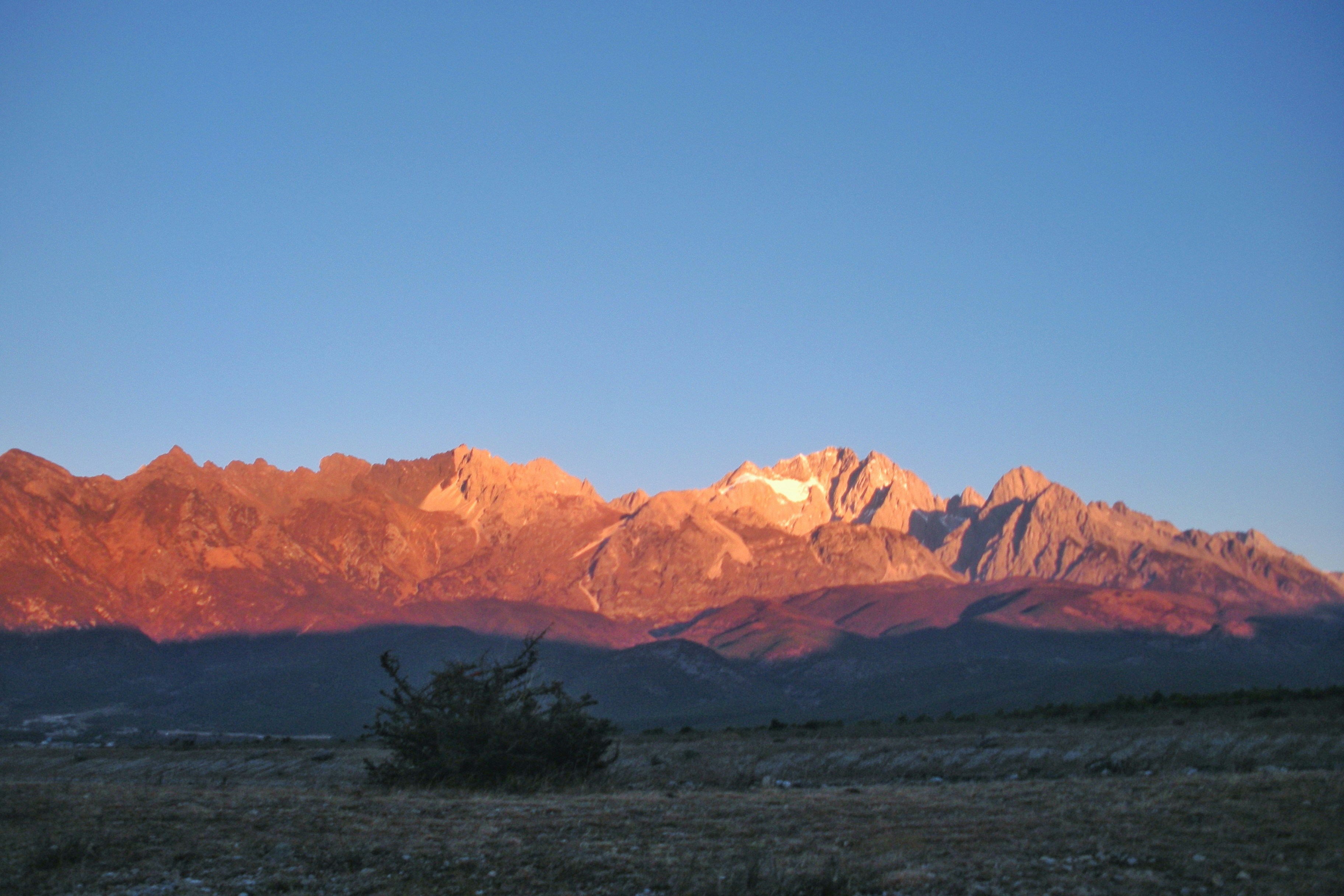 Dawn's Embrace on Majestic Peaks